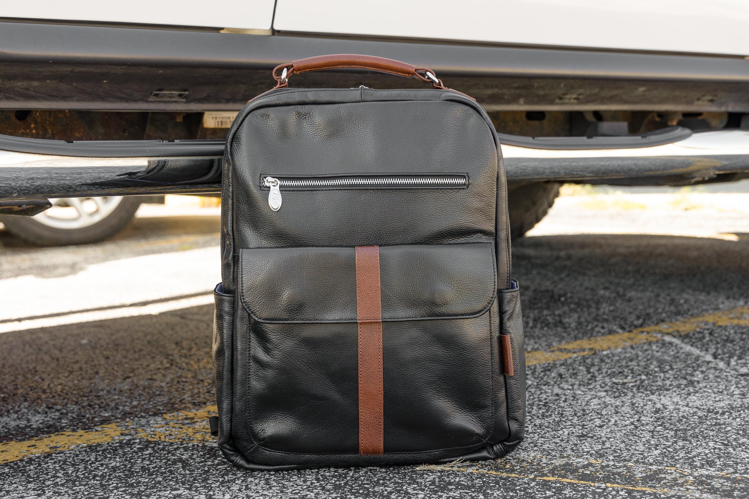McKleinUSA Logan Pebble Grain Calfskin Leather 17" Leather Two-Tone Dual-Compartment Laptop & Tablet Backpack Black (19082)