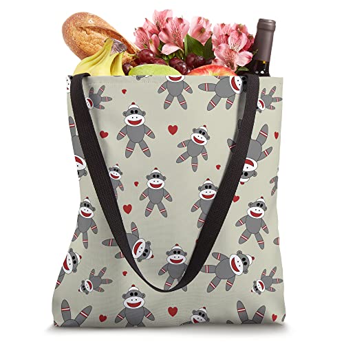 Sock Monkey Studio Cute Sock Monkey Pattern On Tan Tote Bag