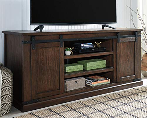 Signature Design by Ashley Budmore Rustic TV Stand Fits TVs up to 68", 2 Sliding Barn Doors and 6 Storage Shelves, Dark Brown