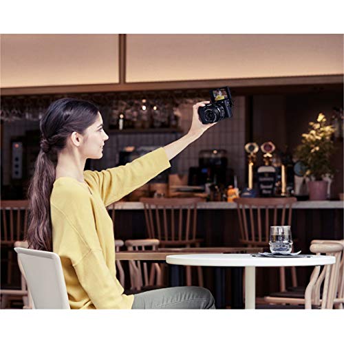 Sony ILCE-6400 a6400 Mirrorless APS-C Interchangeable-Lens Camera Bundle with Deco Gear Bag, 64GB Card, Photo Video Software and Replacement Battery