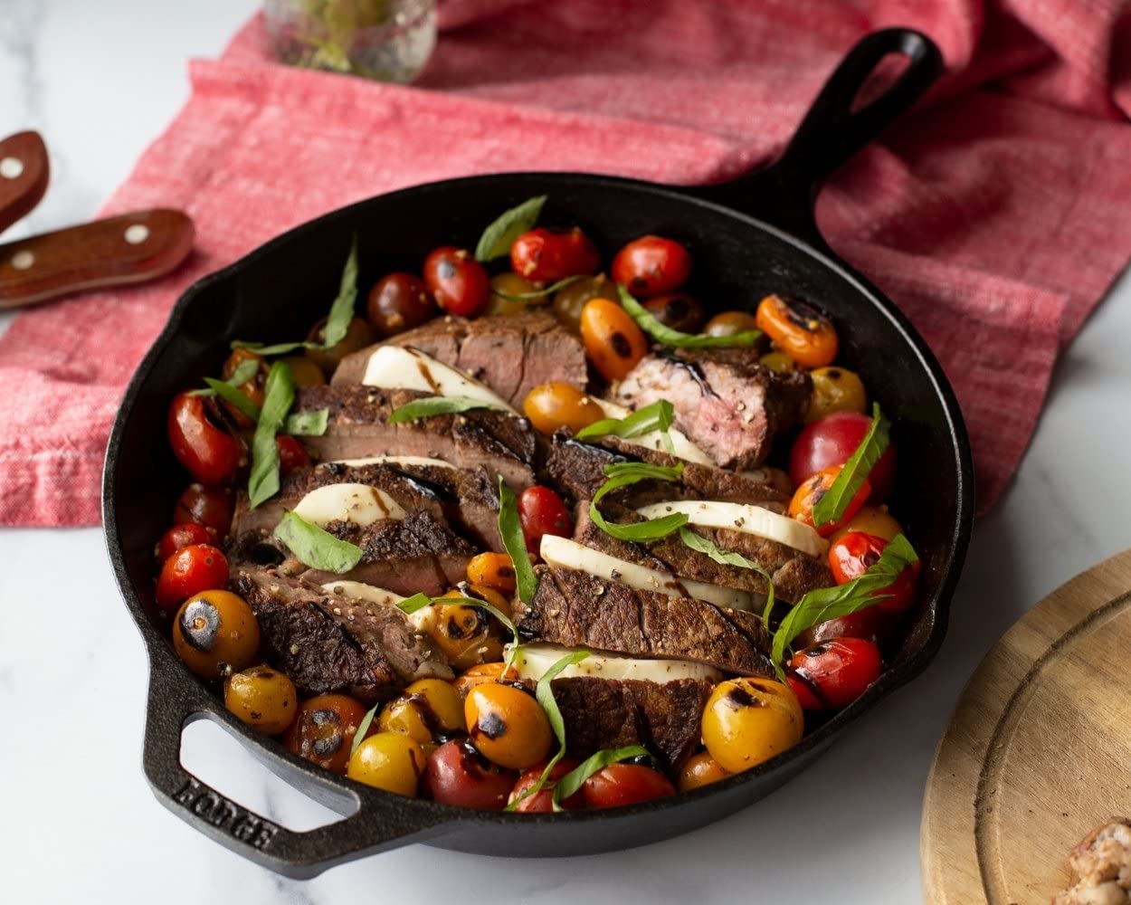Lodge Cast Iron Skillet with Red Silicone Hot Handle Holder, 10.25-inch