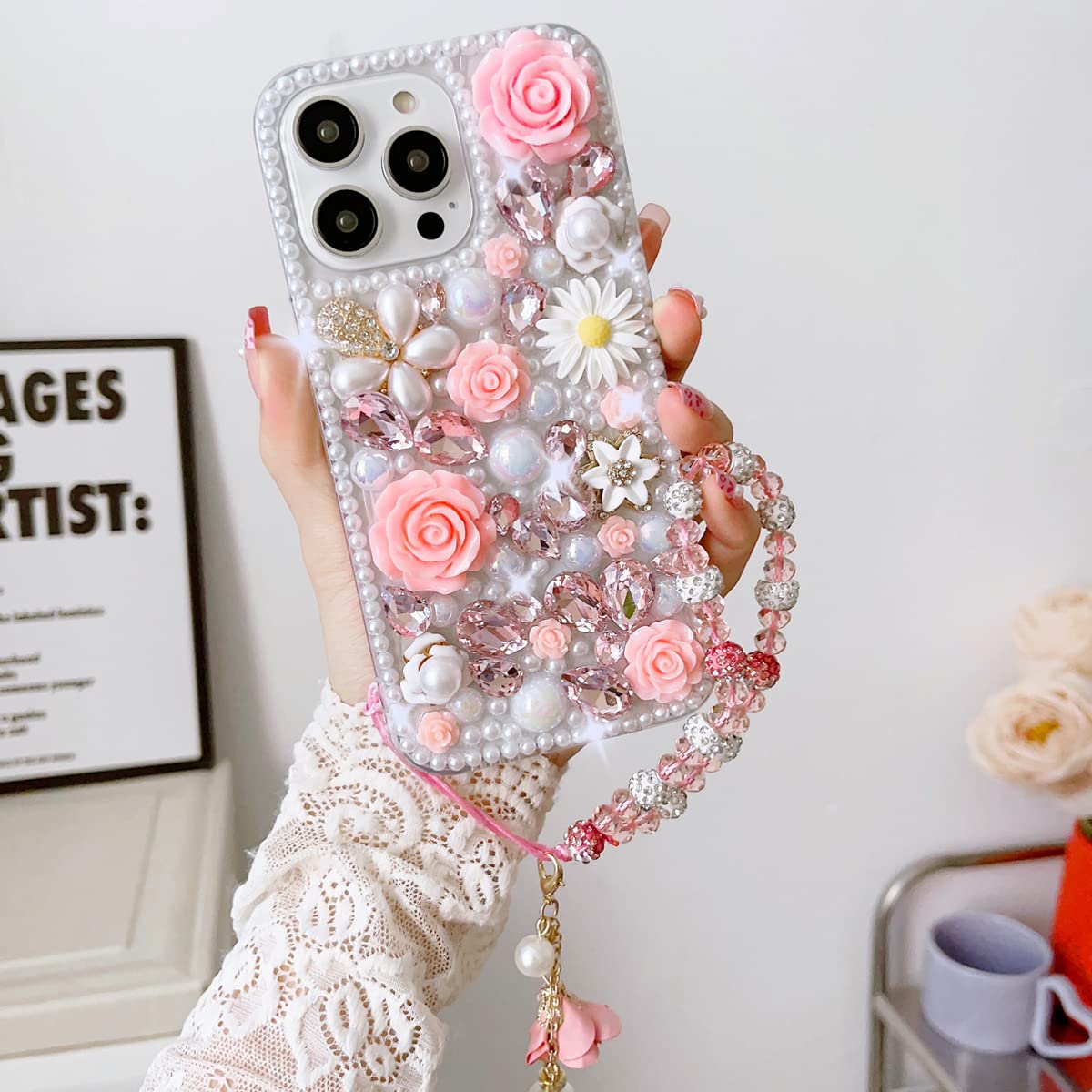 Changjia for iPhone 13 Pro Max Glitter Bling Case, Cute Luxury 3D Crystal Rhinestone Flowers Diamond Pearl with Wrist Strap Bracelet Chain Women Girls Case Cover for iPhone 13 Pro Max 6.7Inch (Pink)