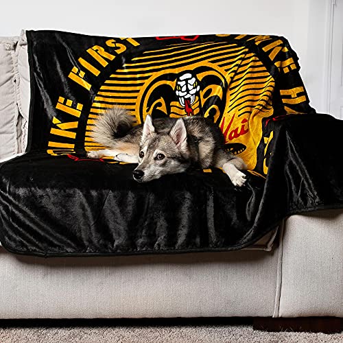 Surreal Entertainment Cobra Kai Strike First Oversized Plush Throw Blanket | Cozy Sherpa Cover For Sofa, Bed Super Soft Fleece Official Karate Kid Collectible 45 x 60 Inches, Yellow, One Size