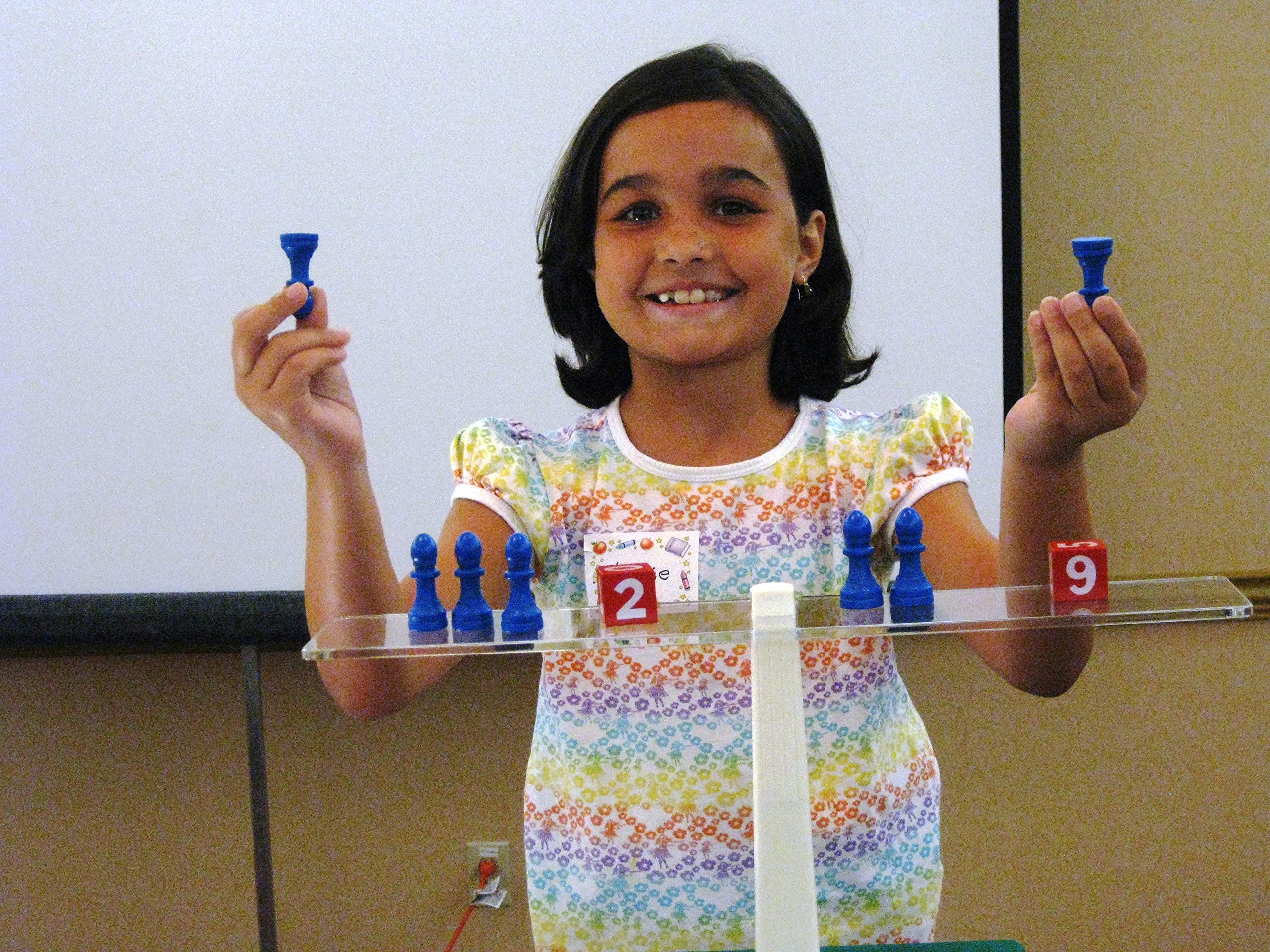 Hands-On Equations® Class Set for Teacher and 20 Students. Includes The Teacher Demonstration Balance Scale and Game Pieces and 20 Sets of Student Manipulatives. Grade 3 and up.