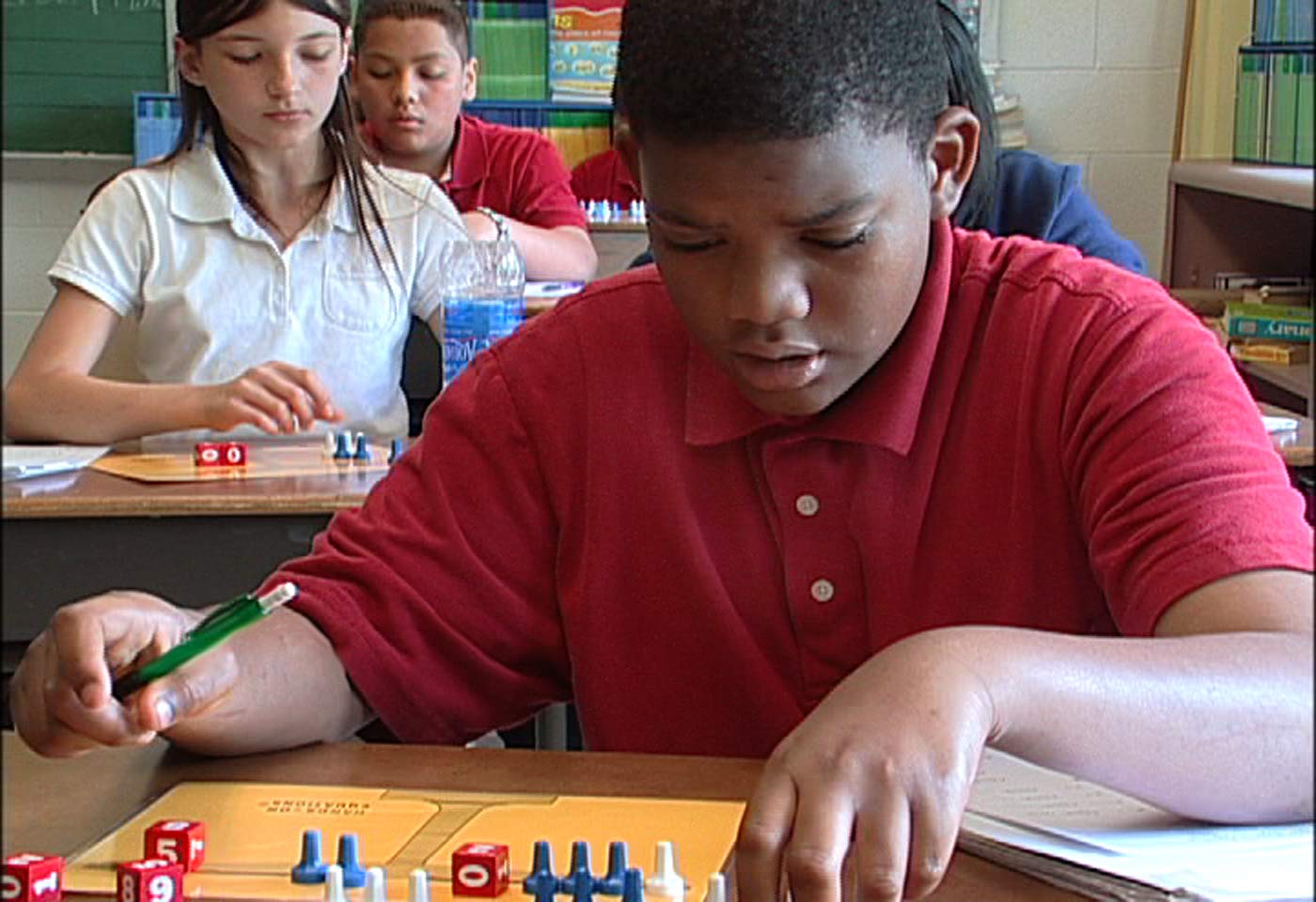 Hands-On Equations® Class Set for Teacher and 20 Students. Includes The Teacher Demonstration Balance Scale and Game Pieces and 20 Sets of Student Manipulatives. Grade 3 and up.