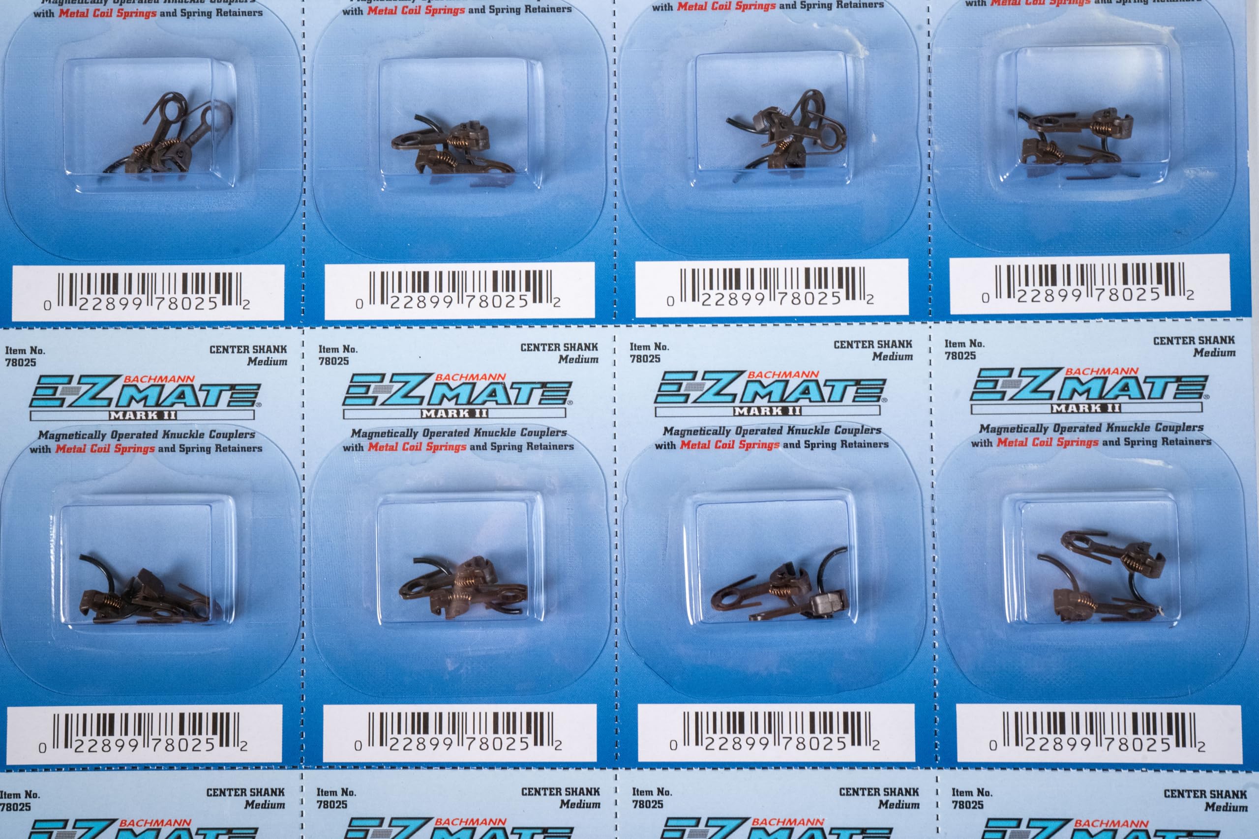 Bachmann Trains - E-Z MATE MARK II COUPLERS - MAGNETIC KNUCKLE COUPLERS with METAL COIL SPRING - CENTER SHANK - MEDIUM (12 pair/card) - HO Scale