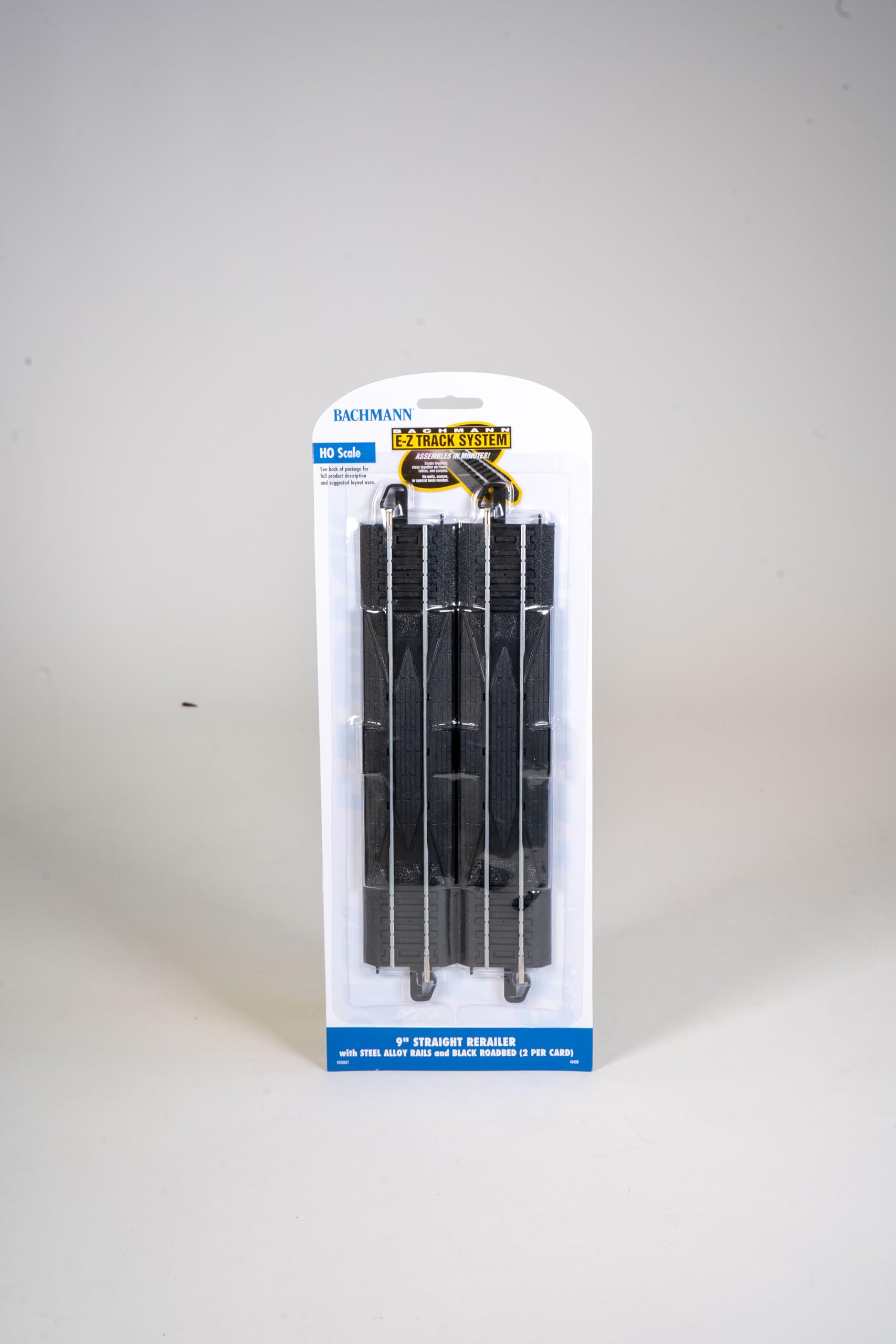 Bachmann Trains - Snap-Fit E-Z TRACK 9” STRAIGHT RERAILER (2/card) - STEEL ALLOY Rail With Black Roadbed - HO Scale