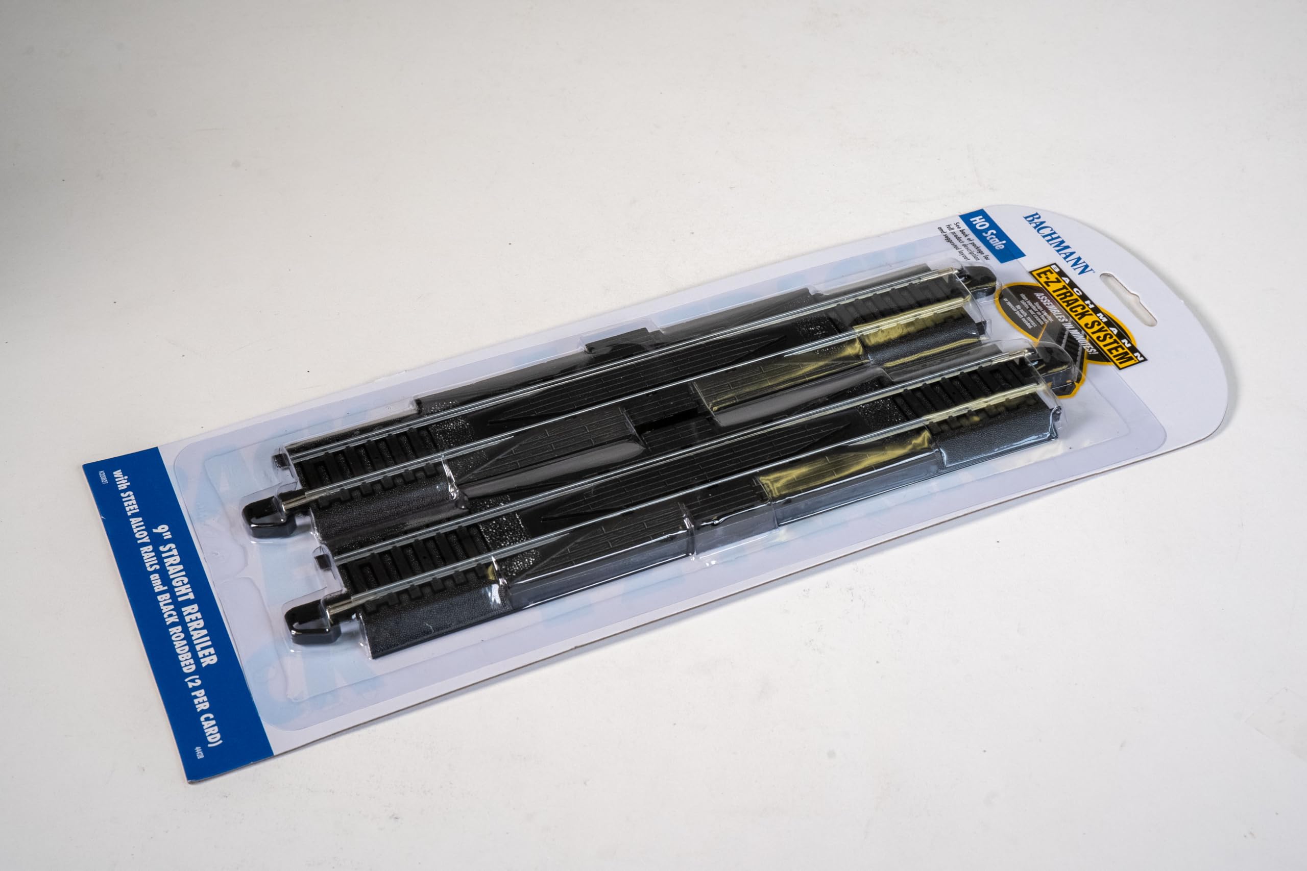 Bachmann Trains - Snap-Fit E-Z TRACK 9” STRAIGHT RERAILER (2/card) - STEEL ALLOY Rail With Black Roadbed - HO Scale