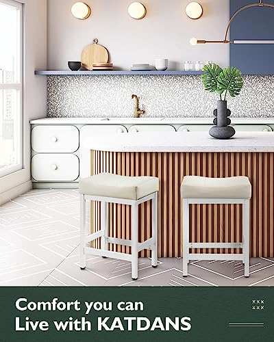 KATDANS Bar Stools Set of 2, 24" Counter Height Saddle Bar Stools, Upholstered PU Leather Bar Stools for Kitchen Island, Mid Century Modern Backless Barstools with Metal Base, KS861P-Cream, 2Pcs