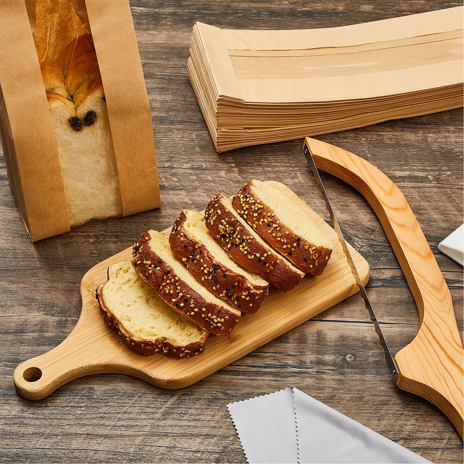 Dandat Wooden Bread Bow Knife 15.7 Inch Serrated Handle Bread Knife With Bread Board And 50 Pcs Paper Bakery Bags, Sourdough Cutter with Linen Storage for Homemade Bagels Kitchen Gift