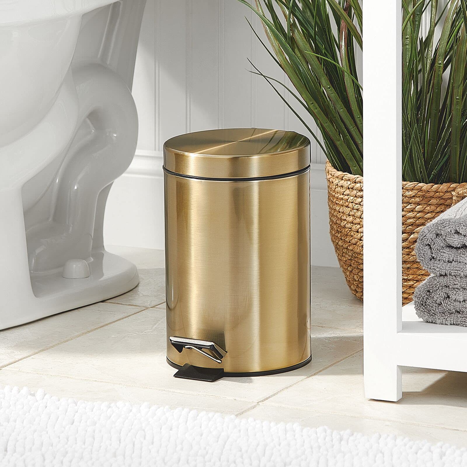 mDesign 3 Liter Round Small Metal Step Trash Can Wastebasket, Garbage Container Bin - for Bathroom, Powder Room, Bedroom, Kitchen, Craft Room, Office - Removable Liner Bucket - Soft Brass