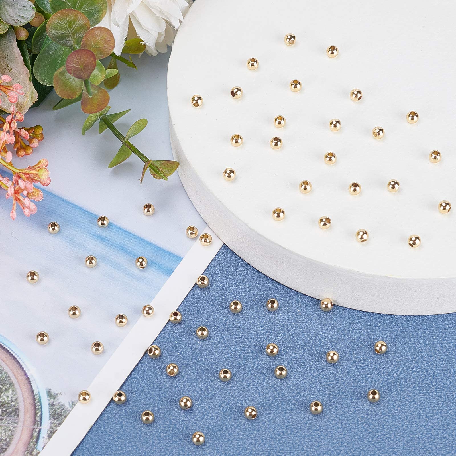 PH PandaHall 300pcs 4mm 14K Gold Plated Brass Beads Long-Lasting Round Smooth Spacer Beads Seamless Loose Ball Beads Gold Metal Beads for Summer Hawaii Stackable Necklace, Bracelet, Earring Making