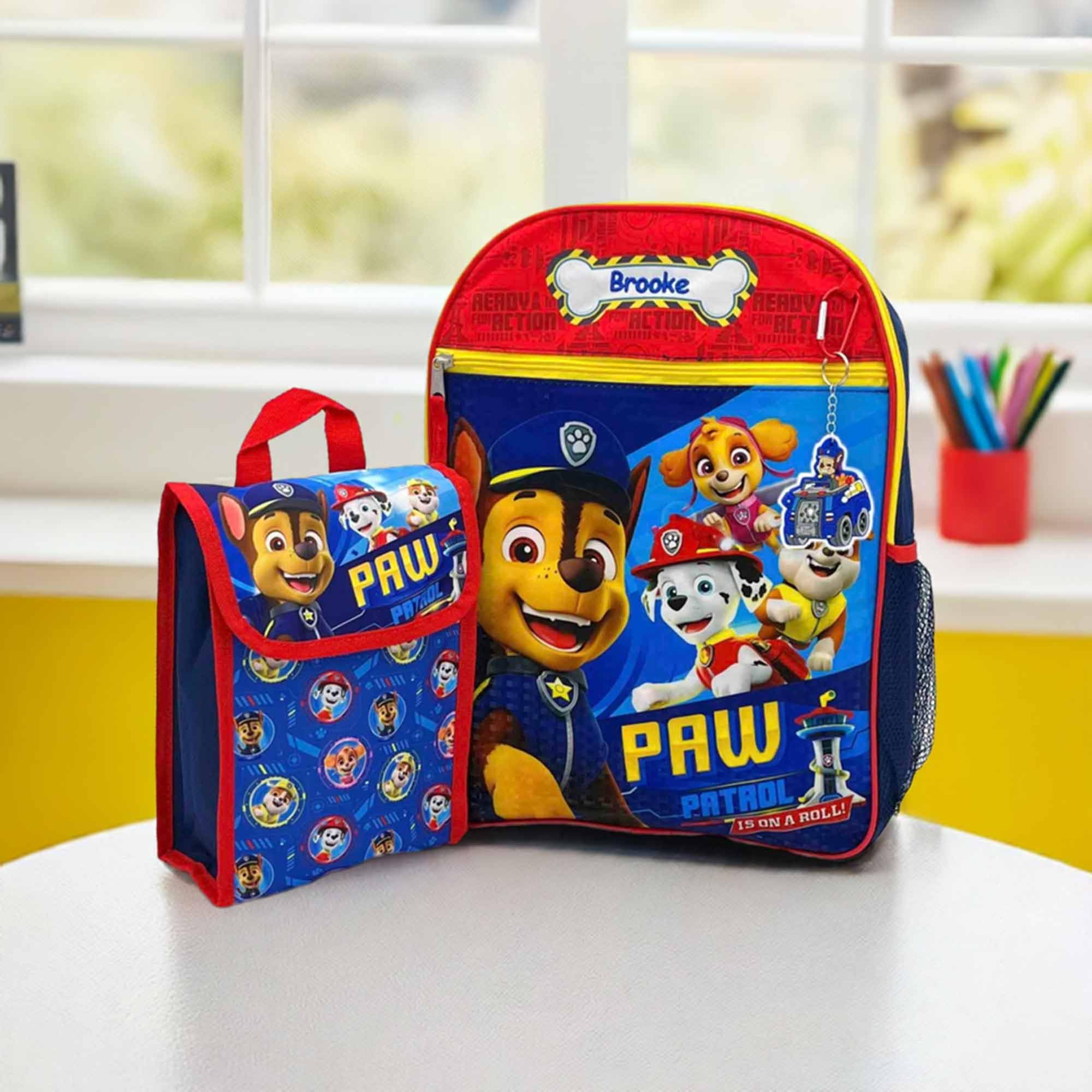 DIBSIES Personalized 16" Paw Team - Chase, Marshall, Rubble, and Skye Is On A Roll Backpack with Bonus Lunch Bag, Carabiner Clip, and Character Dongle