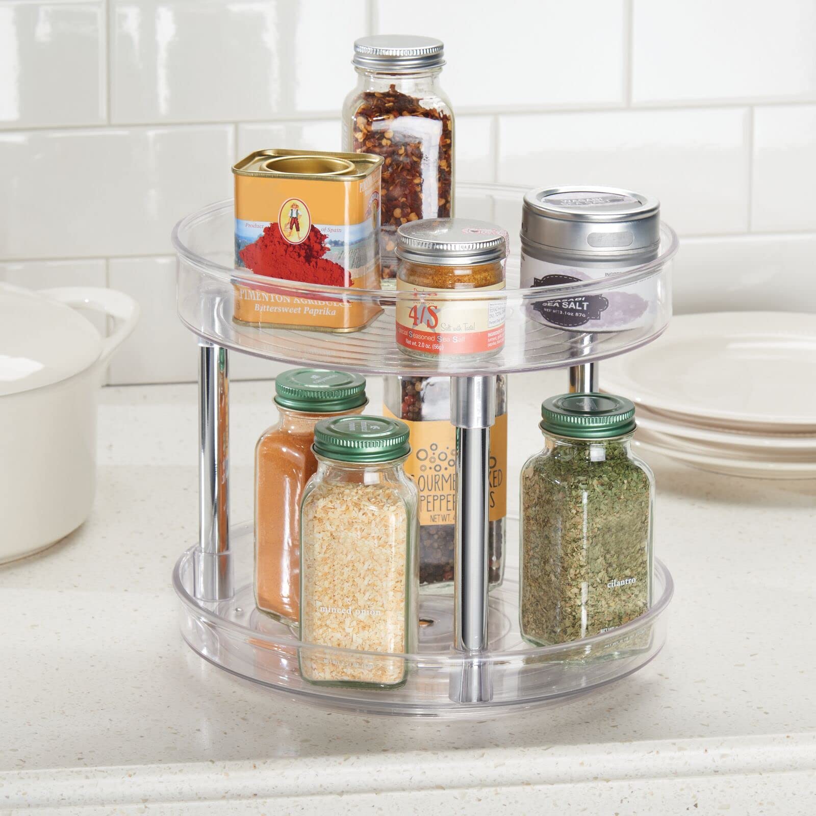 mDesign 2 Tier Lazy Susan Turntable Food Storage Container for Cabinets, Pantry, Fridge, Countertops - Raised Edge, Spinning Organizer for Spices, Condiments - 9" Round, 2 Pack - Clear/Chrome