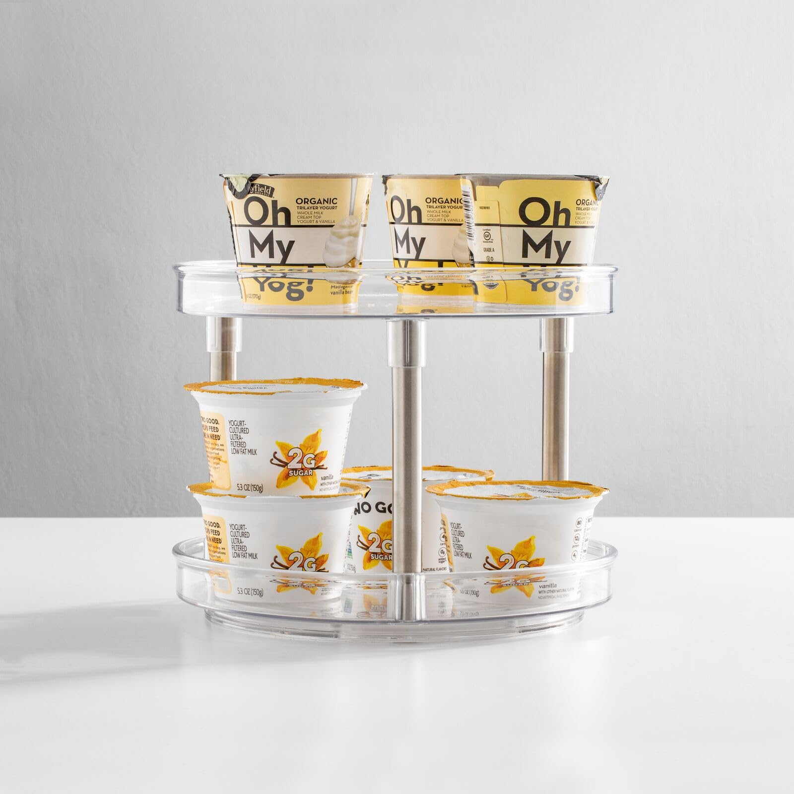 mDesign 2 Tier Lazy Susan Turntable Food Storage Container for Cabinets, Pantry, Fridge, Countertops - Raised Edge, Spinning Organizer for Spices, Condiments - 9" Round, 2 Pack - Clear/Chrome
