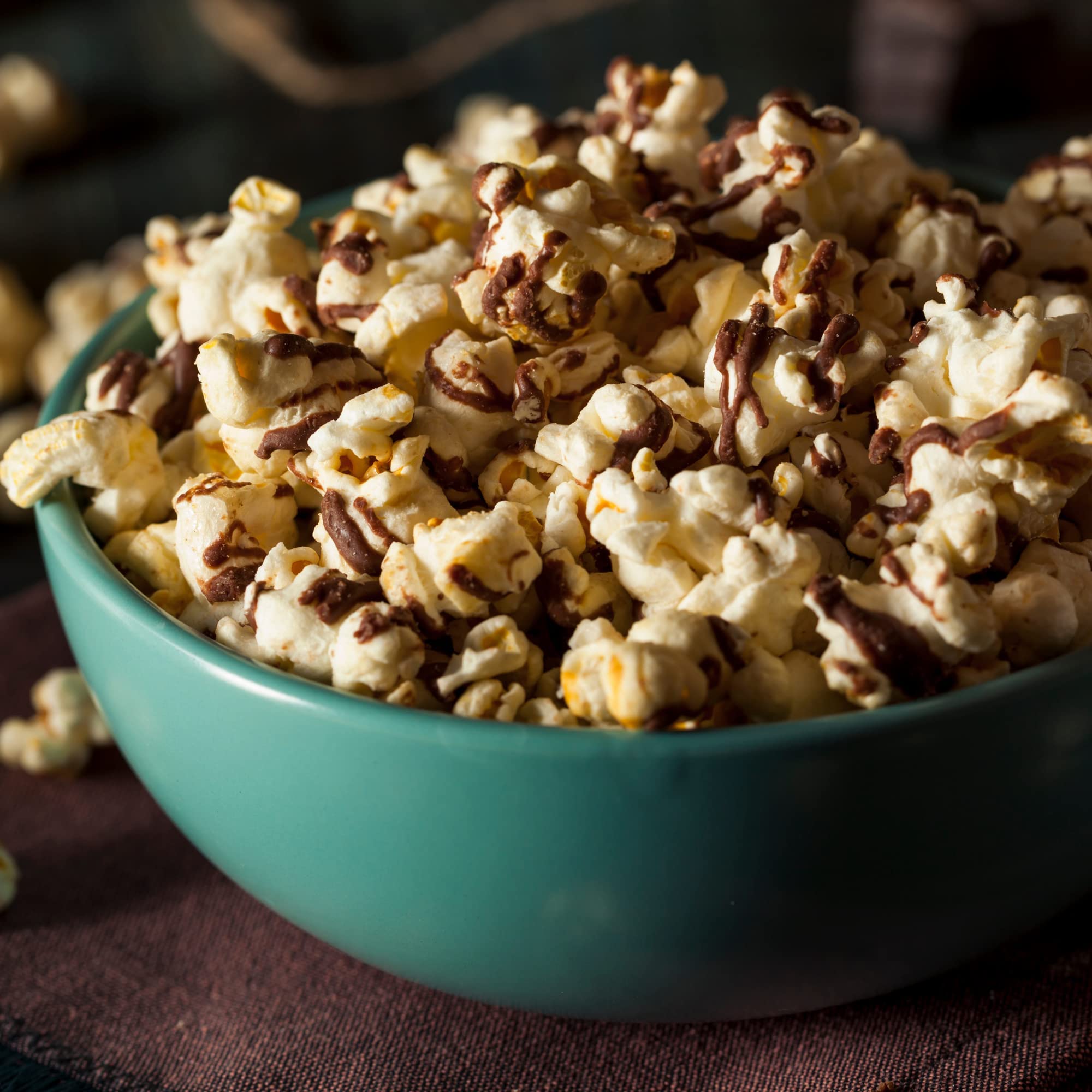 Popcorn Drizzle Sauce Bundle. Includes Two-13.1 Oz Kernel Seasons Drizzle Brittle Popcorn Topping. One Each Flavor: Caramel Drizzle and Chocolate Drizzle. Comes With a BELLATAVO Fridge Magnet!