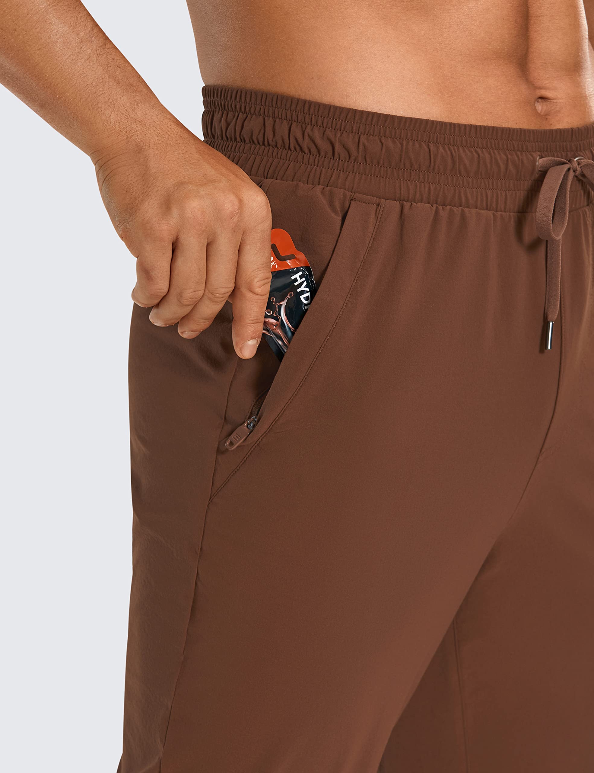 CRZ YOGA Athletic Joggers for Men 29" Lightweight Water Resistant Outdoor Workout Pants with Zip Pockets Dark Brown Large