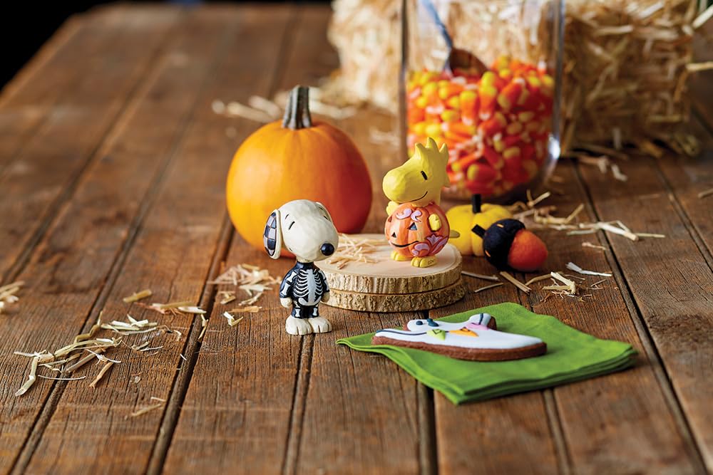 Enesco Peanuts by Jim Shore Halloween Collection Snoopy Dressed as a Skeleton Miniature Figurine- Resin Hand Crafted Painted Collectible Peanuts Snoopy Mini Figurines Home Decor Statue, 3.25 Inch