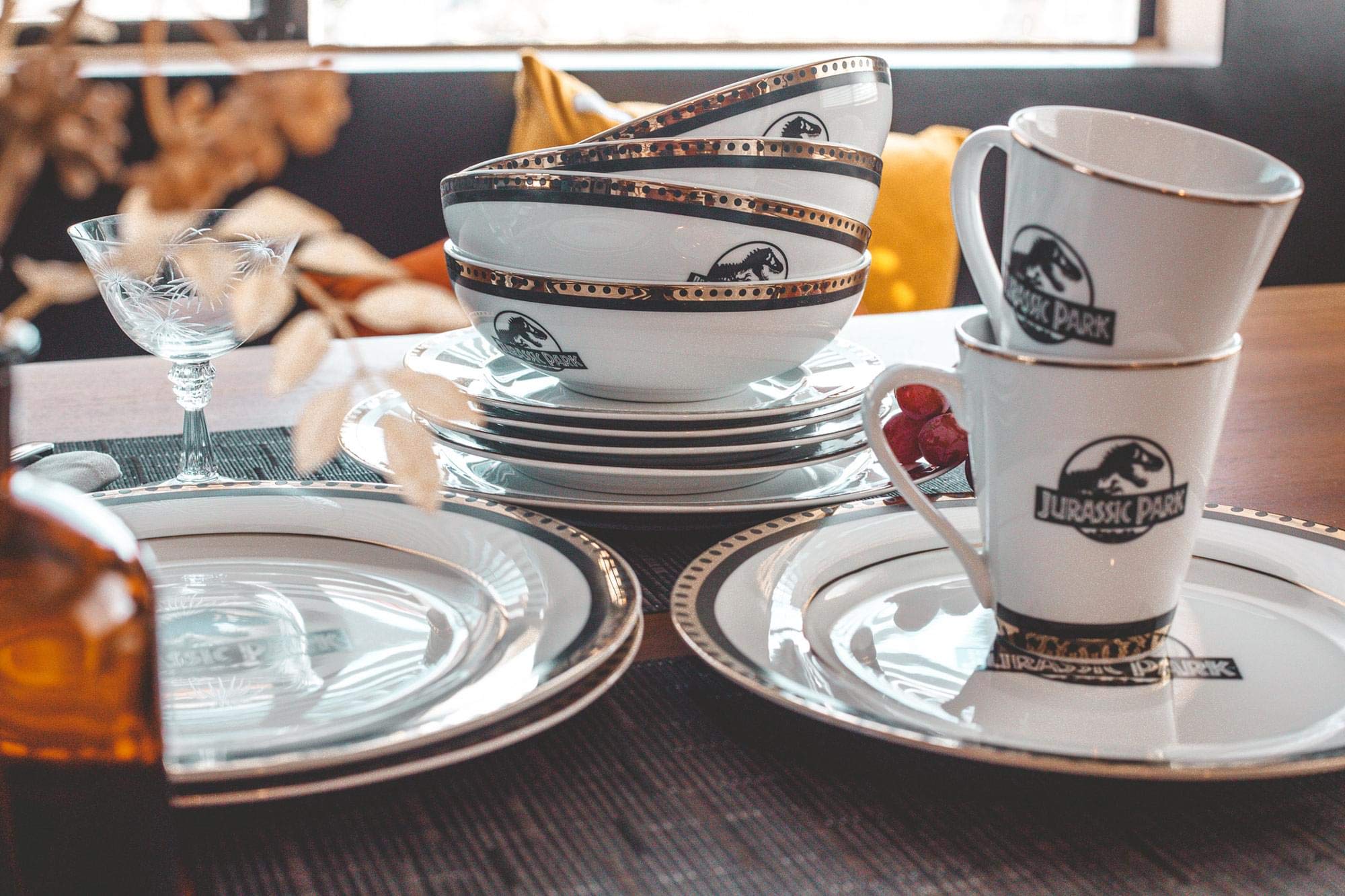 Ukonic Jurassic Park Logo 16-Piece Ceramic Dinnerware Set Replica | Movie-Authentic Dinosaur Dish Set | Includes Dinner Plates, Salad Plates, Soup Bowls, Mugs | Place Setting For 4, White