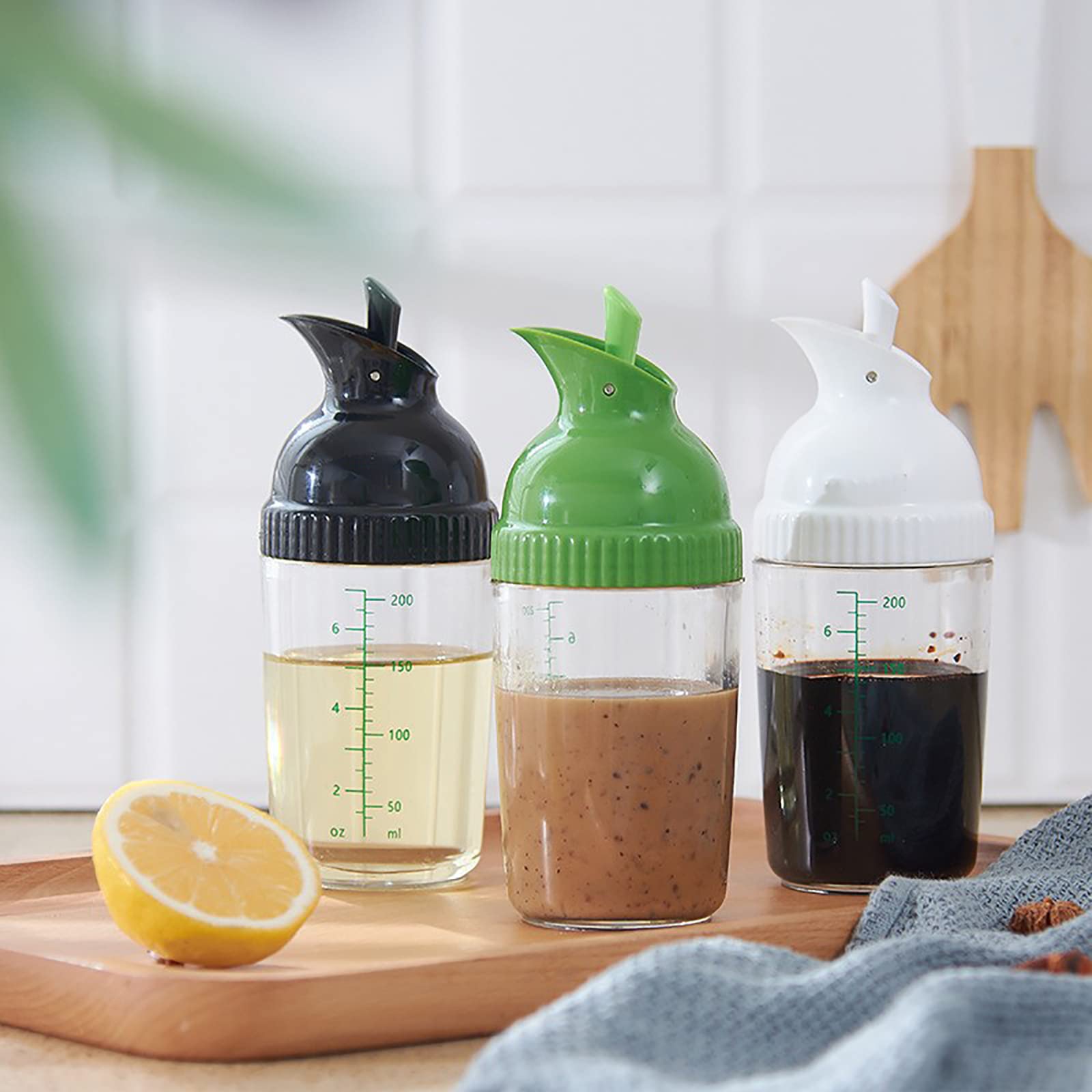 Nicunom 3 Pack Salad Dressing Shaker, 7 Oz Good Grips Dressing Mixer Shaker Bottles, Black & White & Green