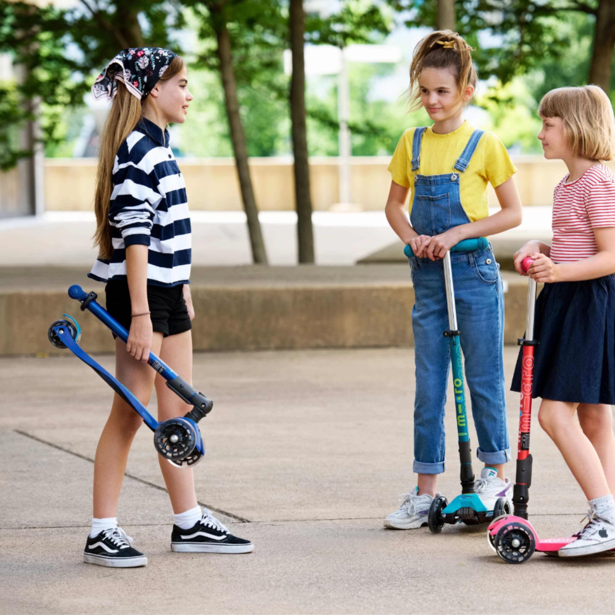 Micro Kickboard - Maxi Deluxe Foldable LED - Three Wheeled, Lean-to-Steer, Fold-to-Carry Swiss-Designed Micro Scooter for Kids with Motion-Activated Light-Up Wheels for Ages 5-12 (Petrol Green)