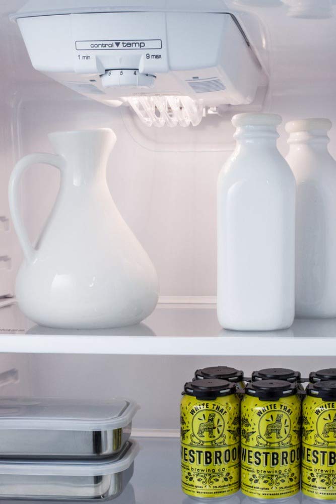 Summit FF1427SS 26"" Top Freezer Refrigerator with 12.9 cu. ft. Capacity Adjustable Glass Shelves Reversible Doors Interior Light in Stainless Steel