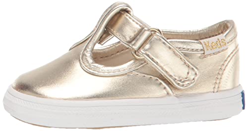 Keds Baby Champion LACE Toe Cap Tstrap Sneaker, Champagne Metallic, 3 US Unisex Infant