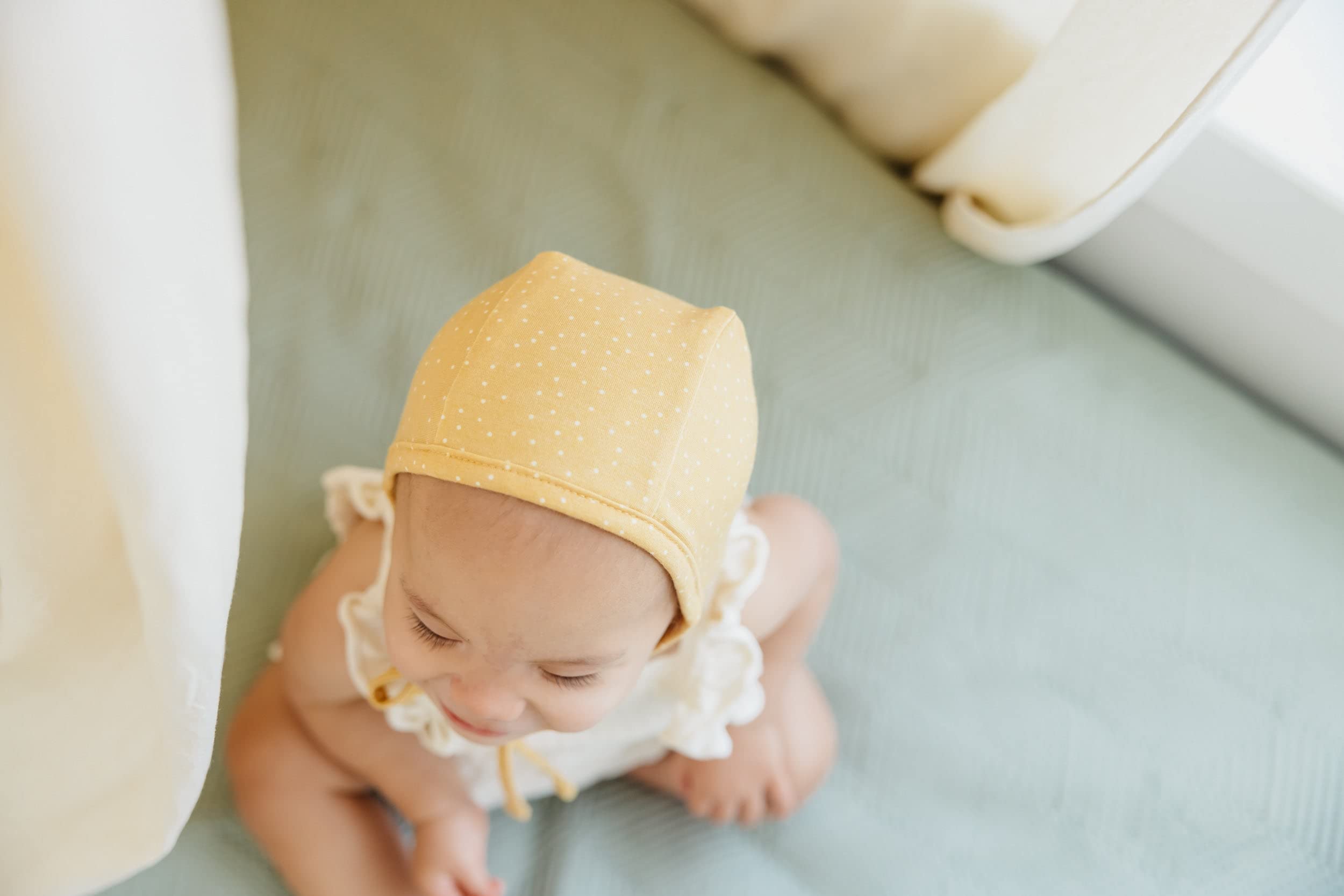 Copper Pearl Baby Bonnets: Ultra-Soft, Comfy to Wear, Tie-On Infant Sun Hat for Protection Against UV Rays, Trendy Coordinating Designs Swaddles, 0-3 Months - Marigold