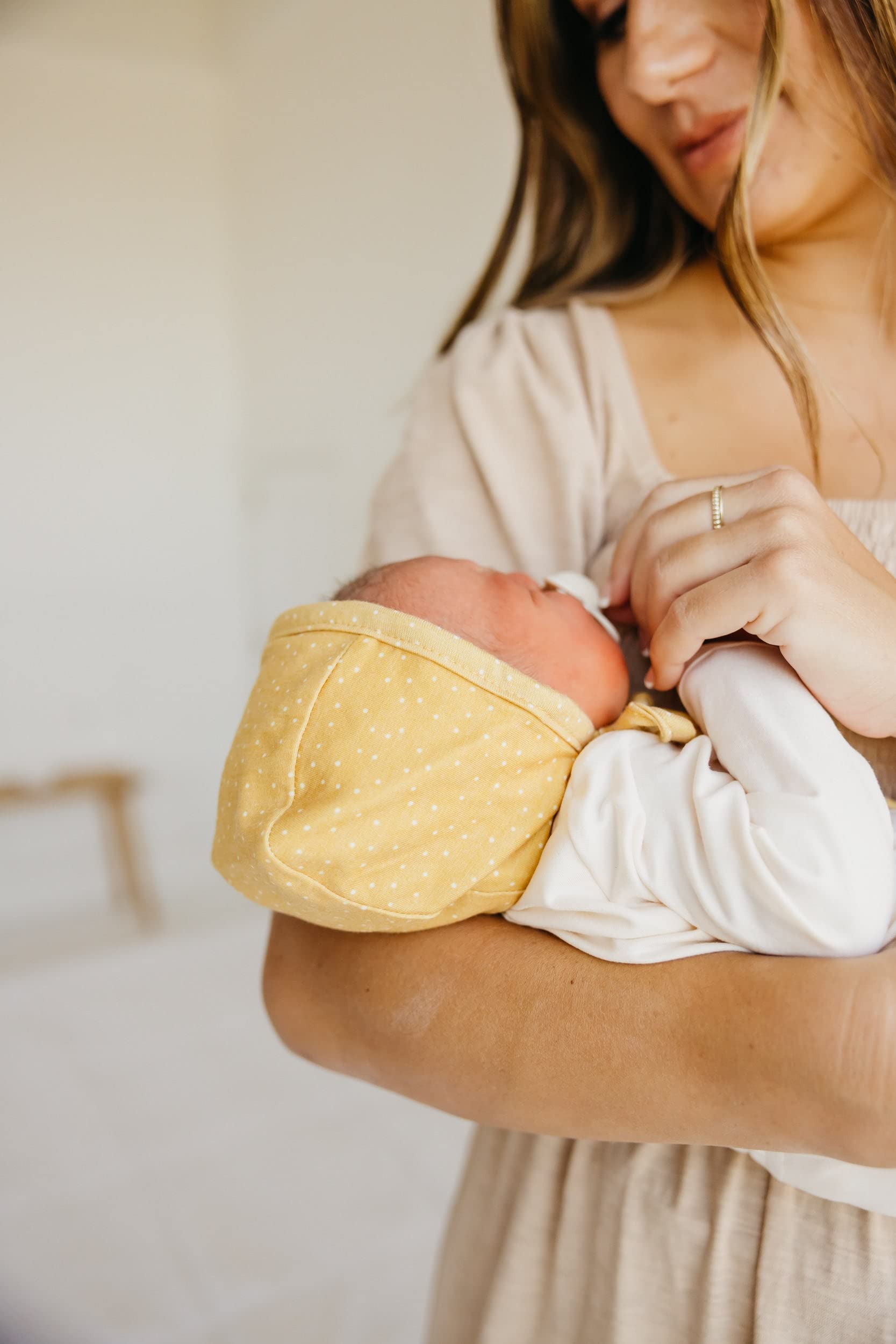Copper Pearl Baby Bonnets: Ultra-Soft, Comfy to Wear, Tie-On Infant Sun Hat for Protection Against UV Rays, Trendy Coordinating Designs Swaddles, 0-3 Months - Marigold