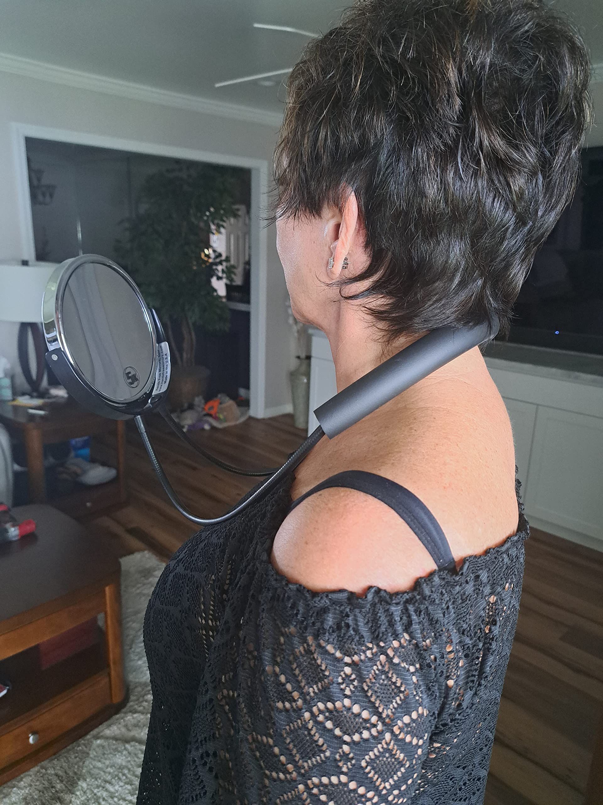 "The Mirrorcle" Great for viewing back of head, traveling, makeup, cutting hair. Cushioned cable is new for comfort to contour to your neck. Std viewing 1 side & 5X on opposite side.
