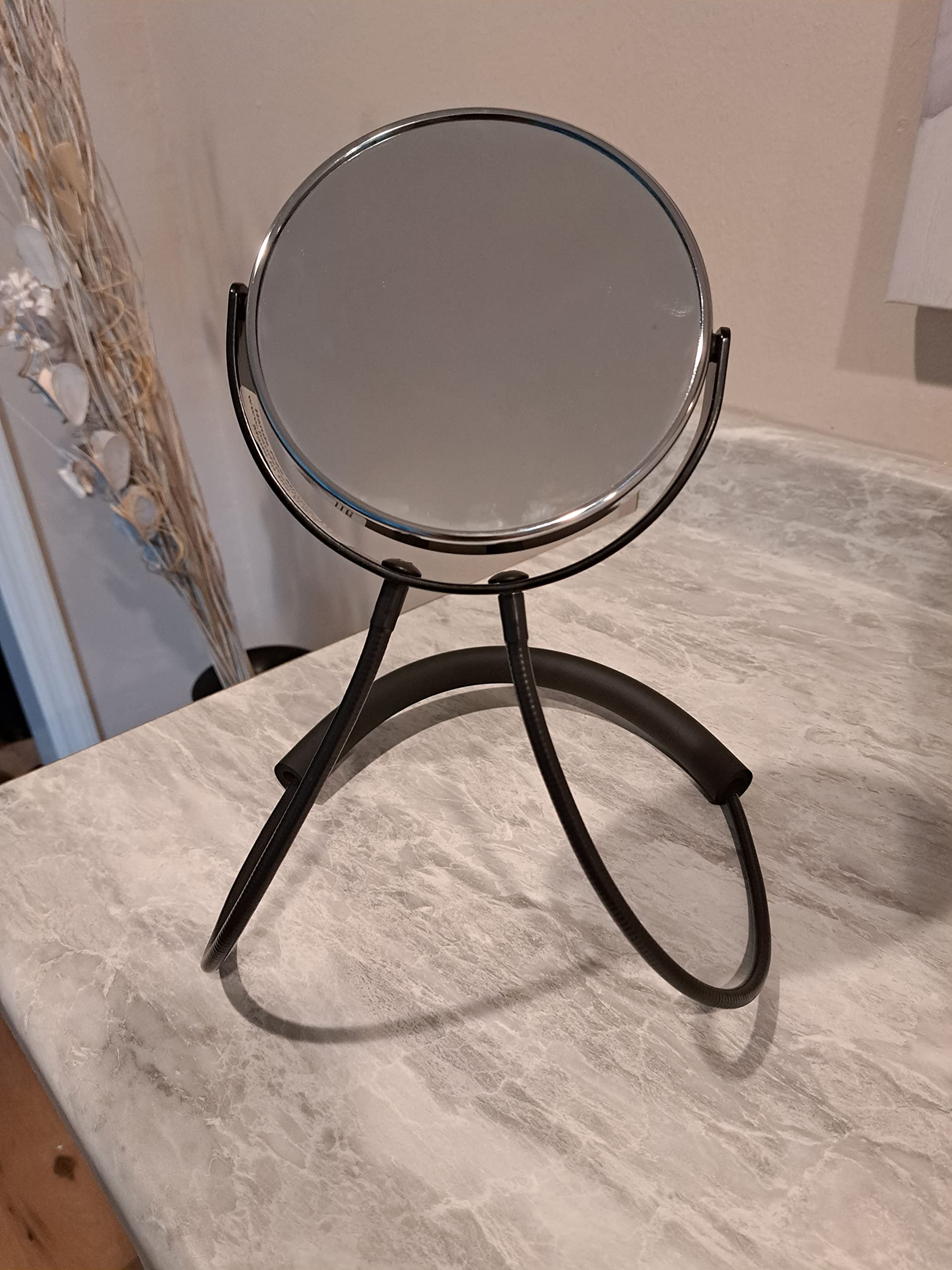 "The Mirrorcle" Great for viewing back of head, traveling, makeup, cutting hair. Cushioned cable is new for comfort to contour to your neck. Std viewing 1 side & 5X on opposite side.
