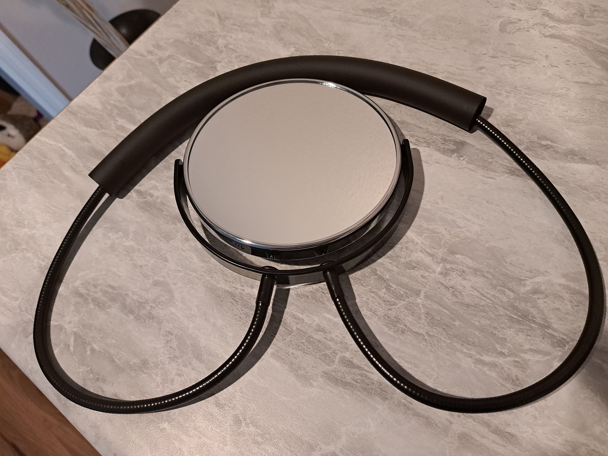"The Mirrorcle" Great for viewing back of head, traveling, makeup, cutting hair. Cushioned cable is new for comfort to contour to your neck. Std viewing 1 side & 5X on opposite side.