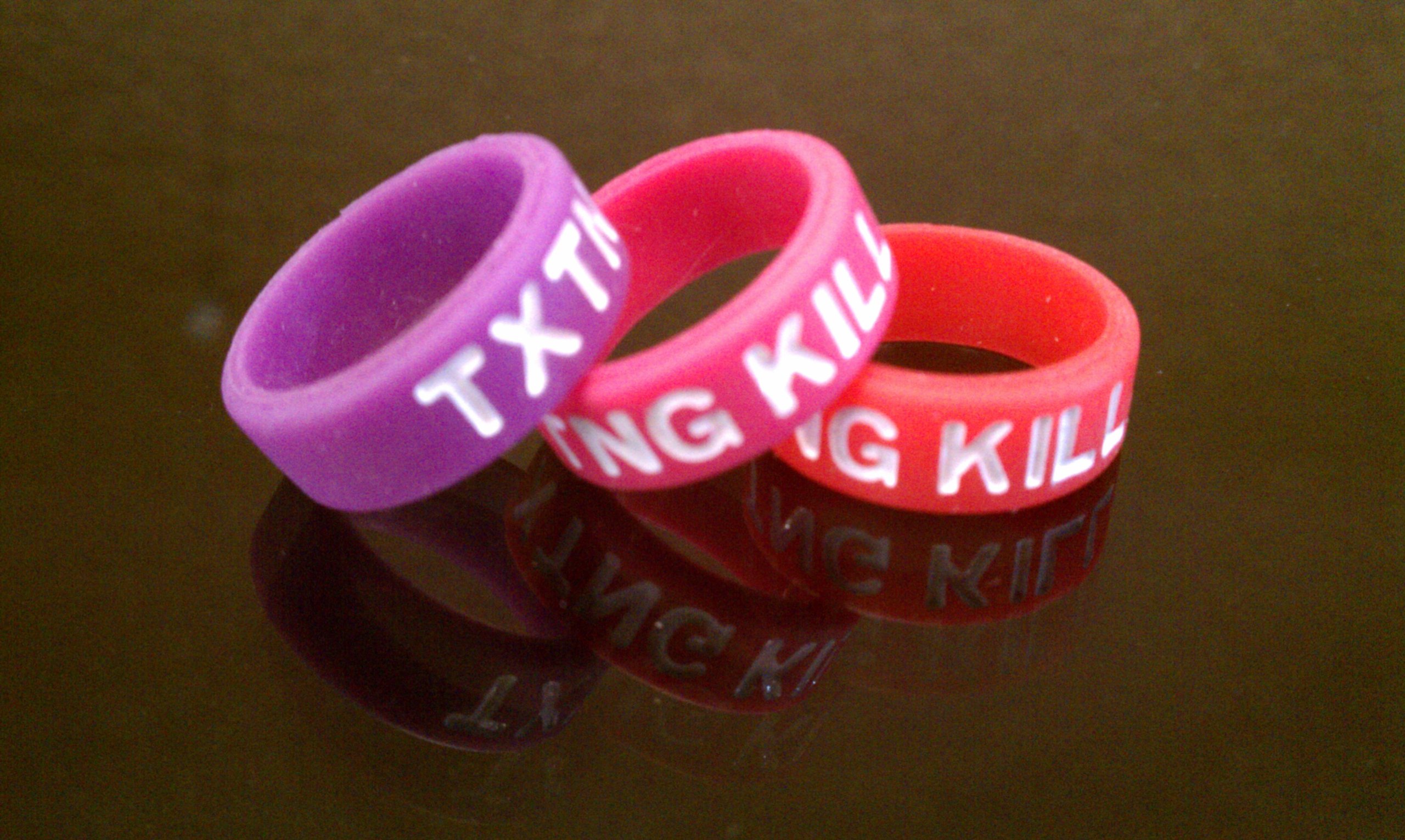 "TXTNG KILLS" Texting Thumb Band Thumb Rings 3 Pack Pink, Purple and Red - One Each