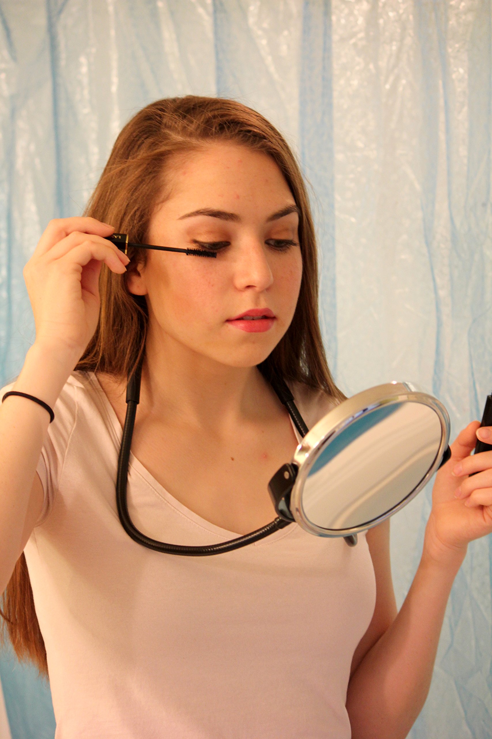 "The Mirrorcle" Great for viewing back of head, traveling, makeup, cutting hair. Cushioned cable is new for comfort to contour to your neck. Std viewing 1 side & 5X on opposite side.