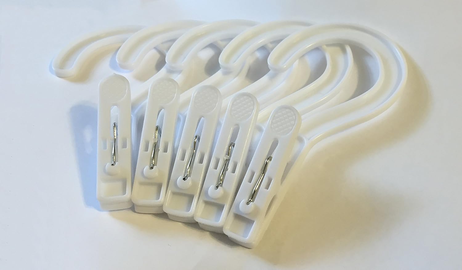 (12 Pcs) White Melvado Laundry Hanger Hooks | Strong Plastic Solid Metal Spring | Lightweight, Convenient Clothing Pins to Hang and Dry Wet Clothes | for Home Use or Travel | Economy