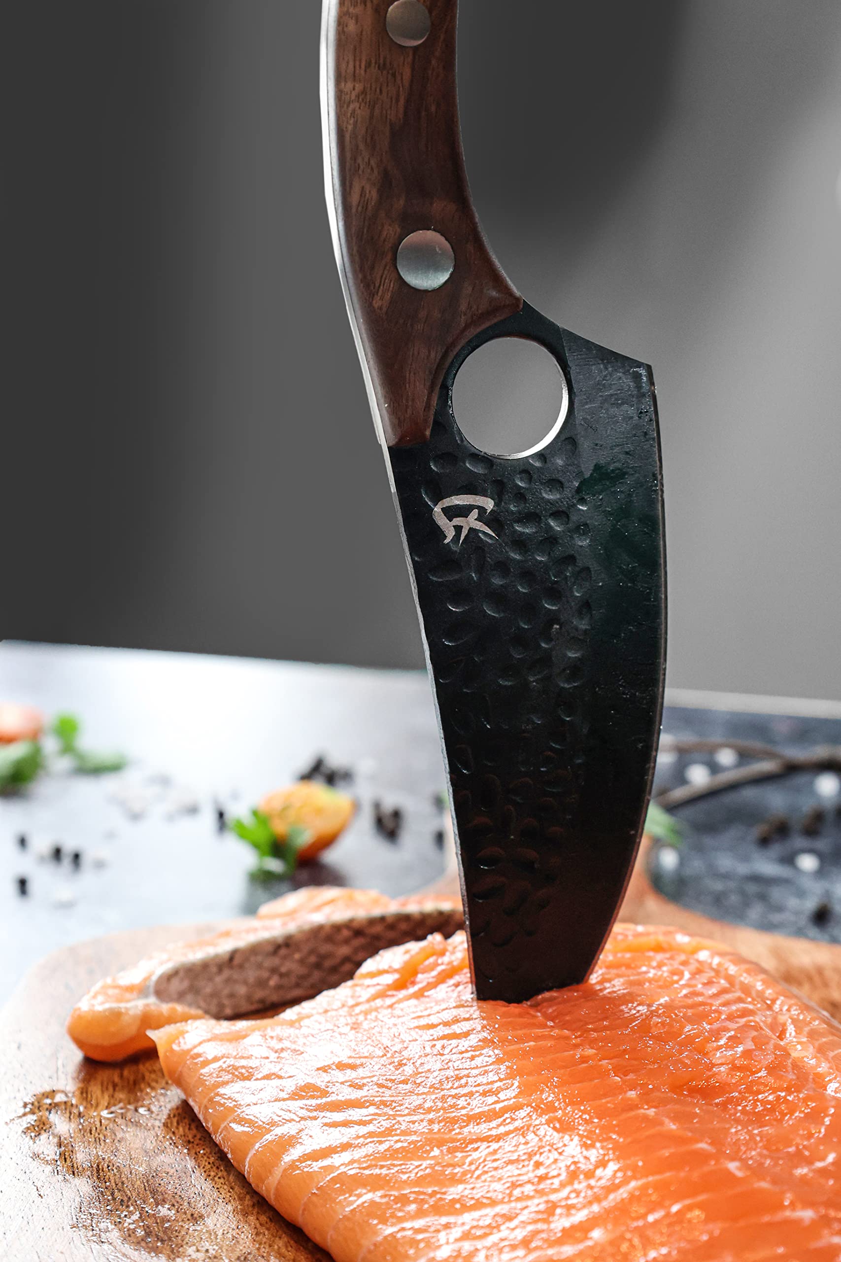 An amazing Hand Forged Butcher Knife with Reinforced Black Titanium Coated Blade that is perfect for everyday kitchens, camping, and BBQ