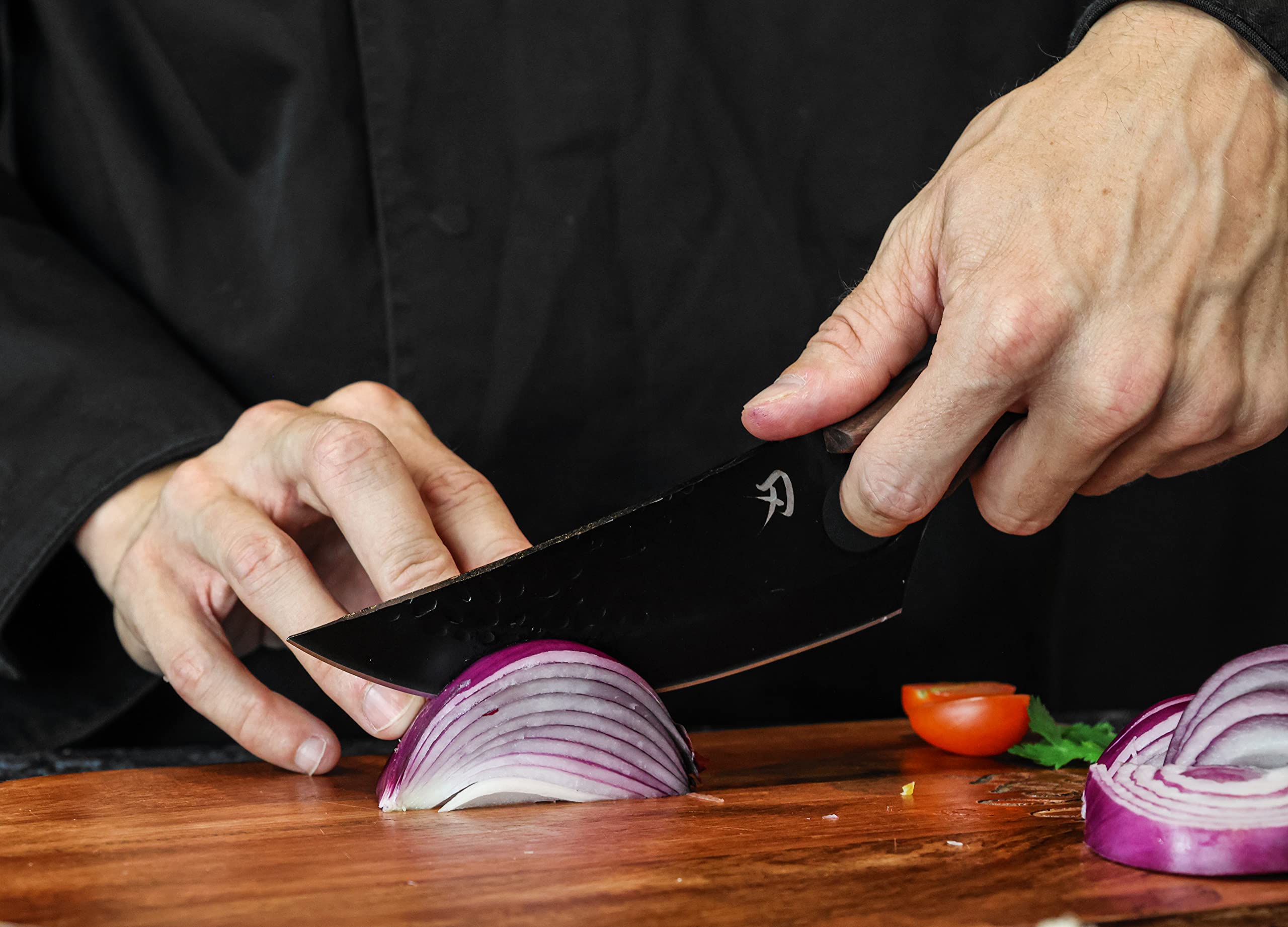 An amazing Hand Forged Butcher Knife with Reinforced Black Titanium Coated Blade that is perfect for everyday kitchens, camping, and BBQ