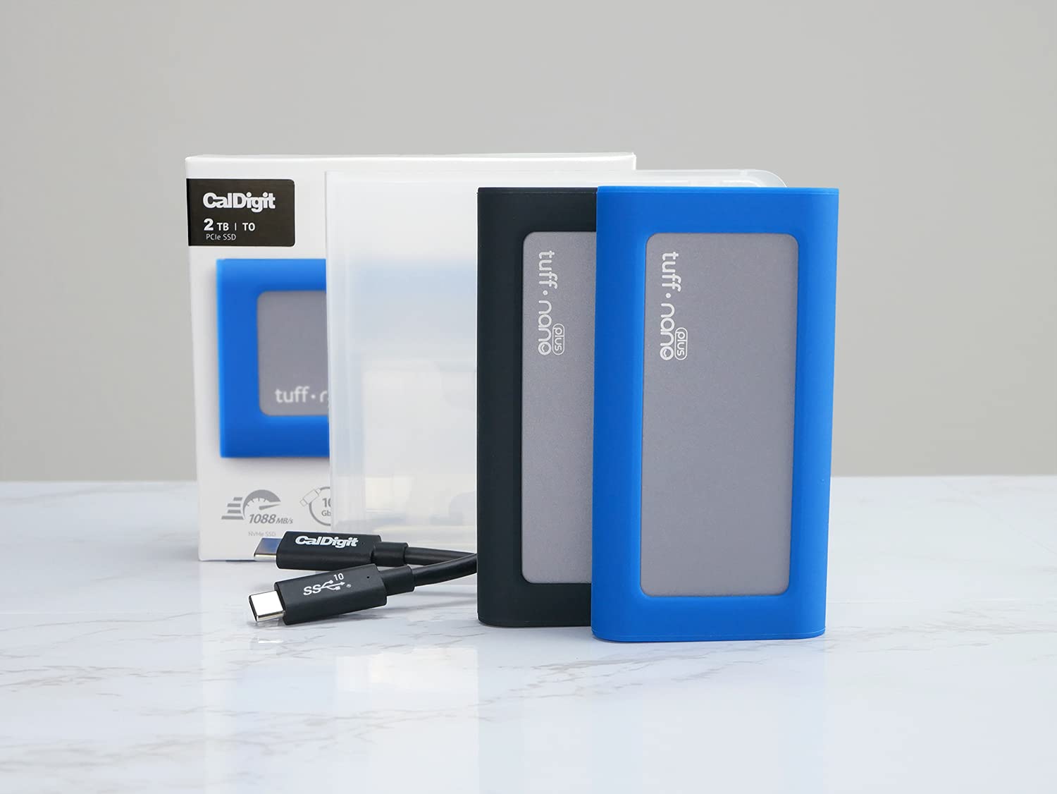 CalDigit Tuff Nano Plus 2TB - Compact Rugged IP67 Waterproof USB-C 3.2 Gen 2 10Gb/s External NVME SSD, Compatible with Thunderbolt 4 Mac and PC, Up to 1055MB/s (2TB Nano Plus, Charcoal Black)