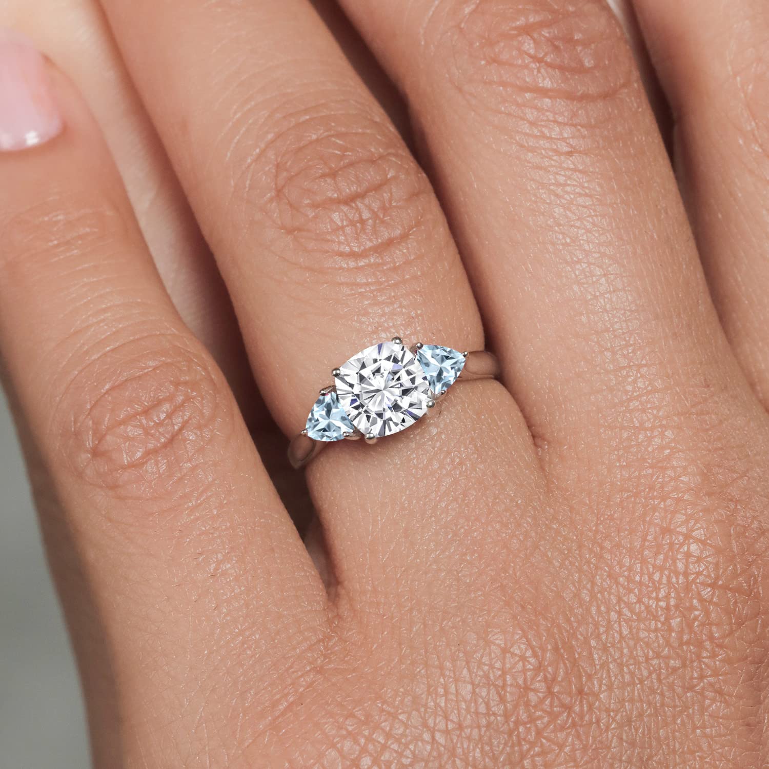 10K White Gold White Moissanite from Charles & Colvard and Sky Blue Aquamarine 3-Stone Engagement Ring For Women (2.11 Cttw, 7MM Cushion and 4MM Trillion, Available In Size 5, 6, 7, 8, 9)