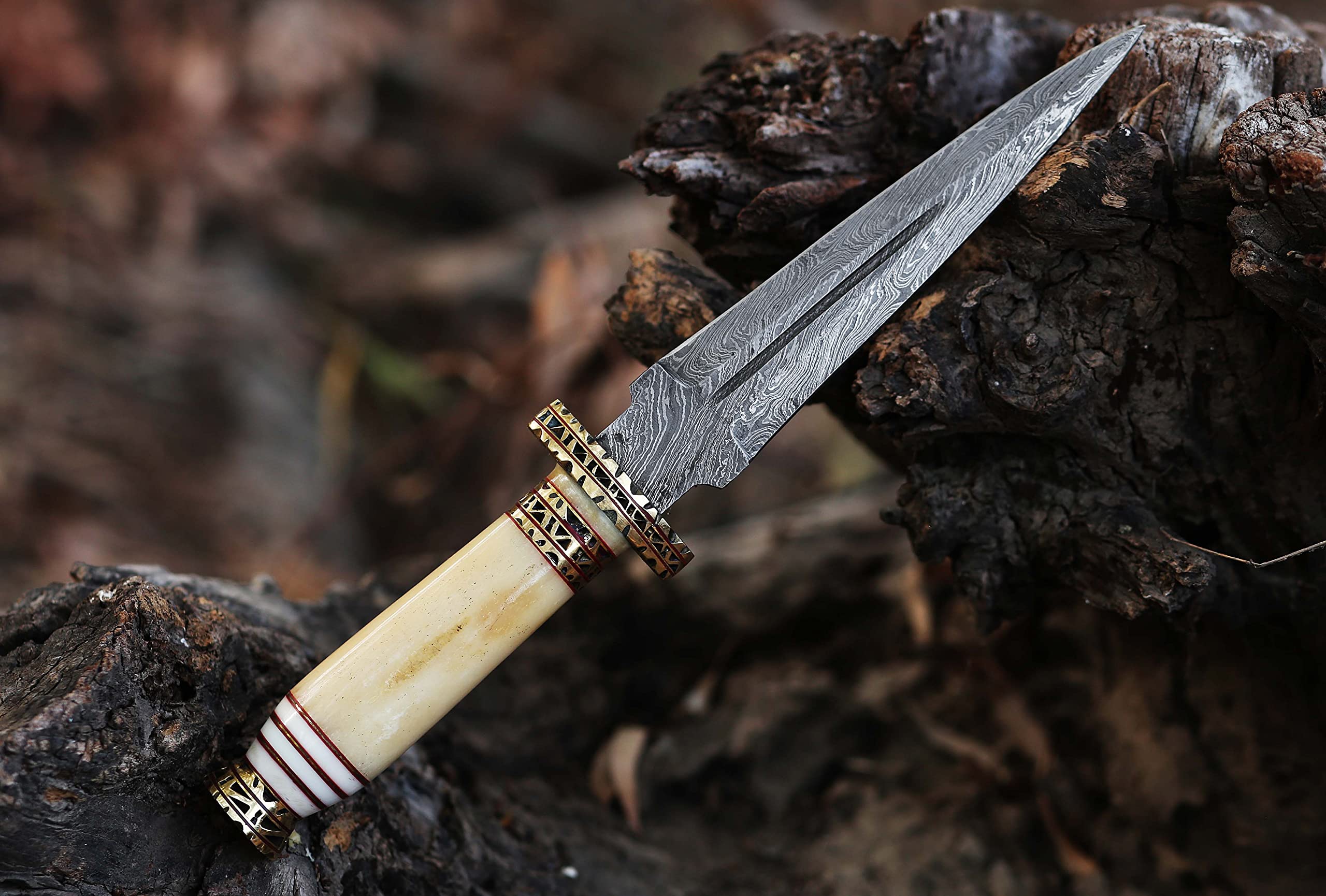 12.5 Inch long Hunting knife, Collectible knife, Natural Camel bone scale embellished with engraved brass finger guard, foil work spacer and pommel, Hand forged Twist pattern Damascus steel blade, Comes with Leather sheath
