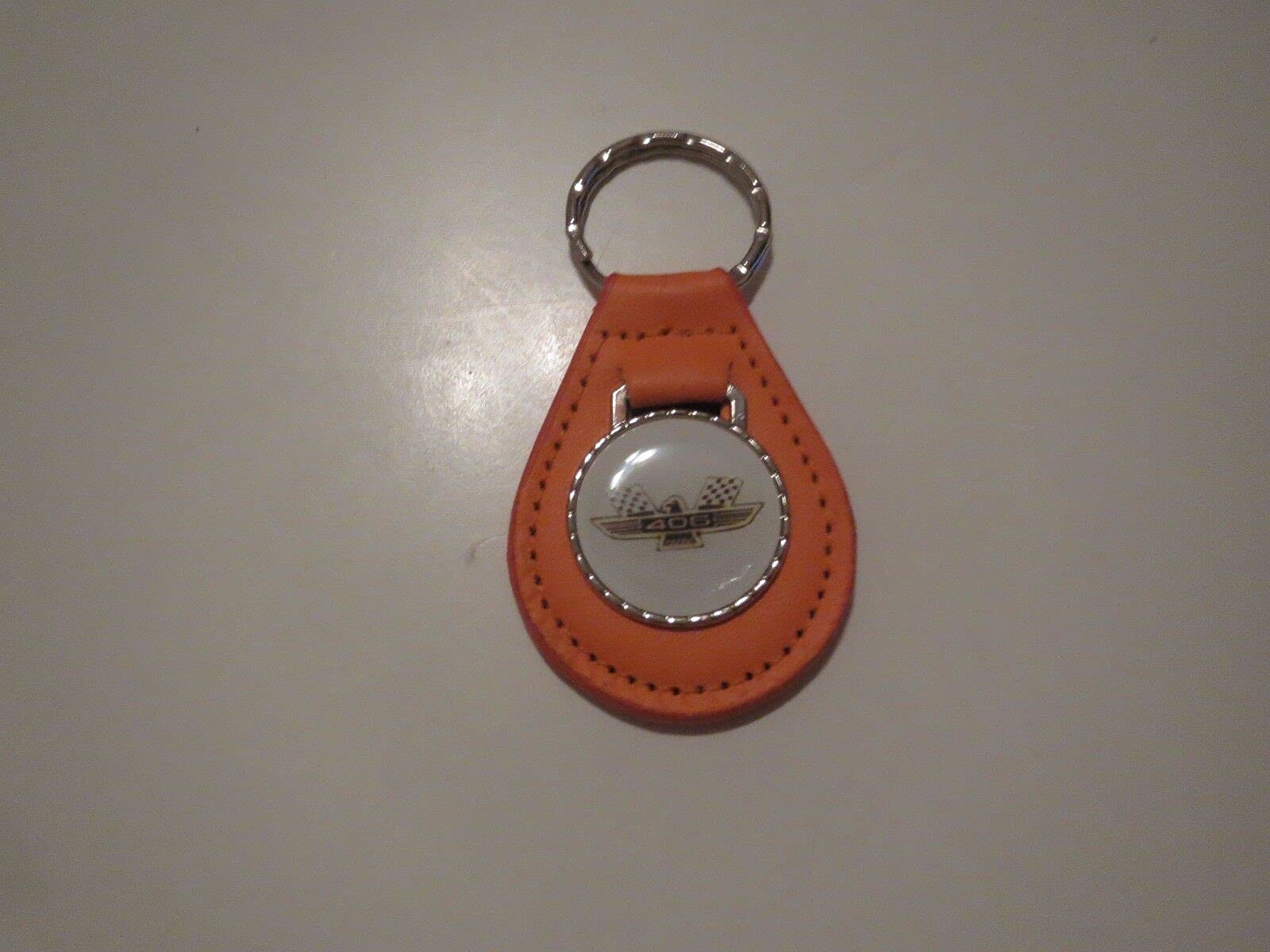 1962 1963 GALAXIE 406 BIRD WHITE & GOLD LOGO LEATHER KEYCHAIN - PUMPKIN
