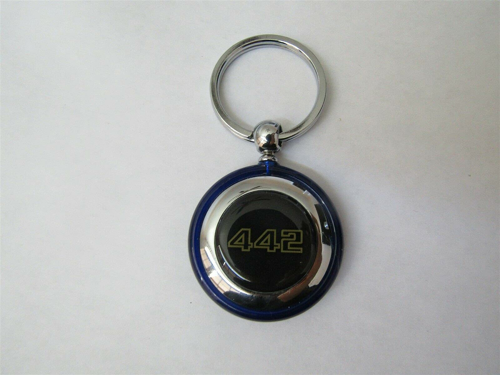 1970's 1986 1987 OLDS 442 4-4-2 GOLD/BLACK LOGO ROUND PLASTIC KEYCHAIN - BLUE