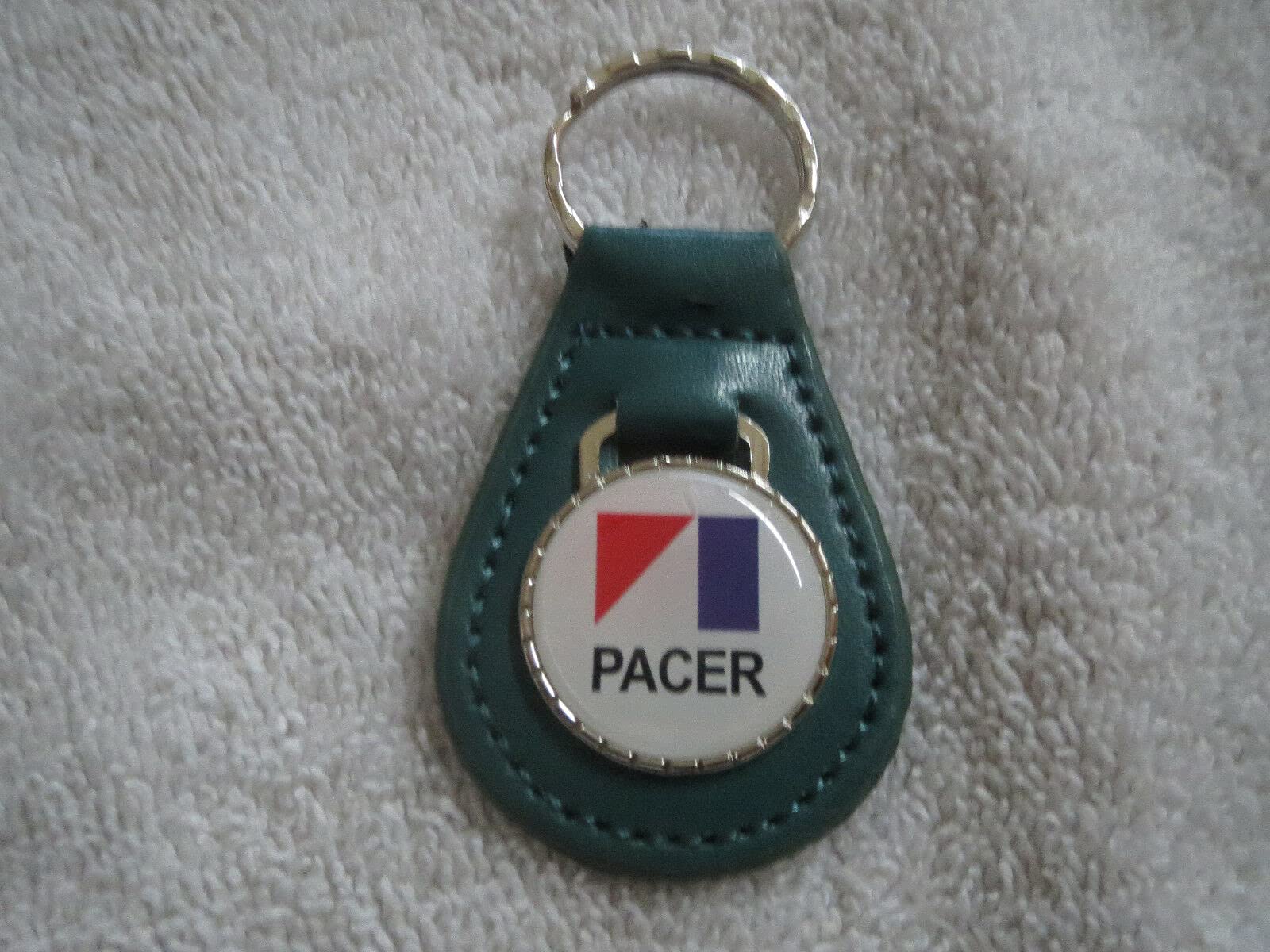 1975 1976 1977 1978 1979 AMC PACER LOGO EMBLEM LEATHER KEYCHAIN - TEAL