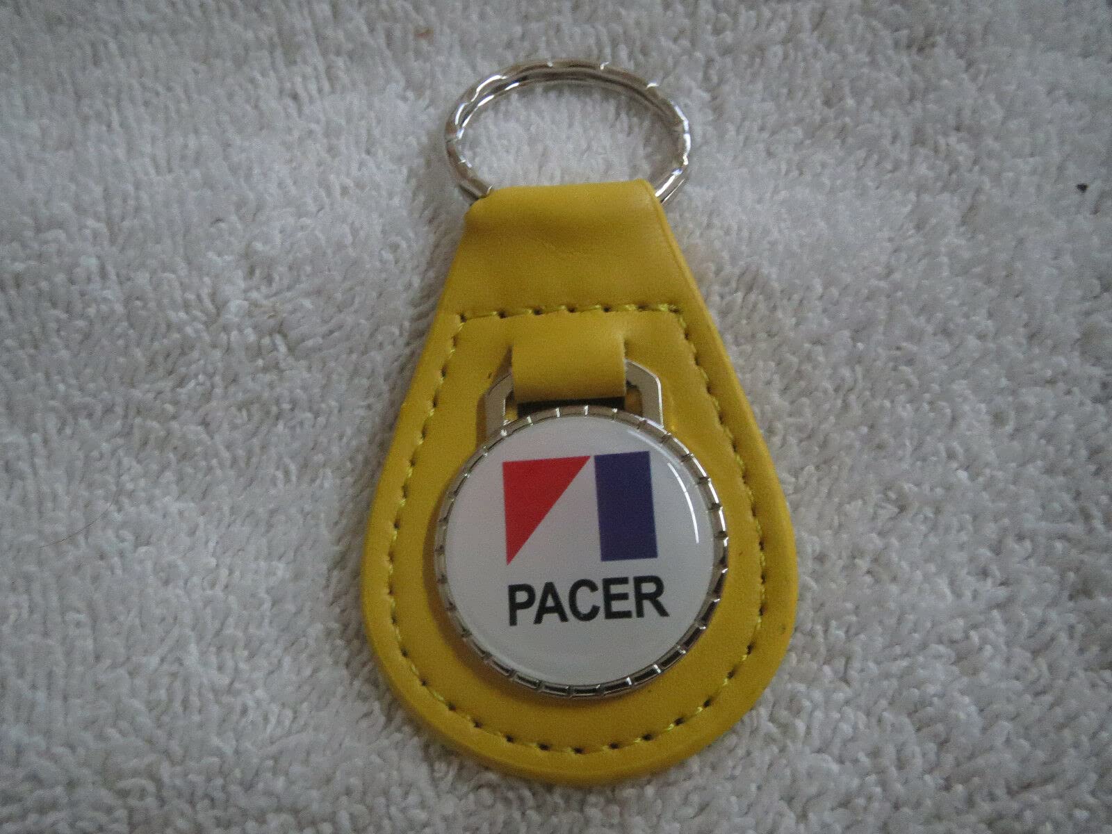 1975 1976 1977 1978 1979 AMC PACER LOGO EMBLEM LEATHER KEYCHAIN - YELLOW