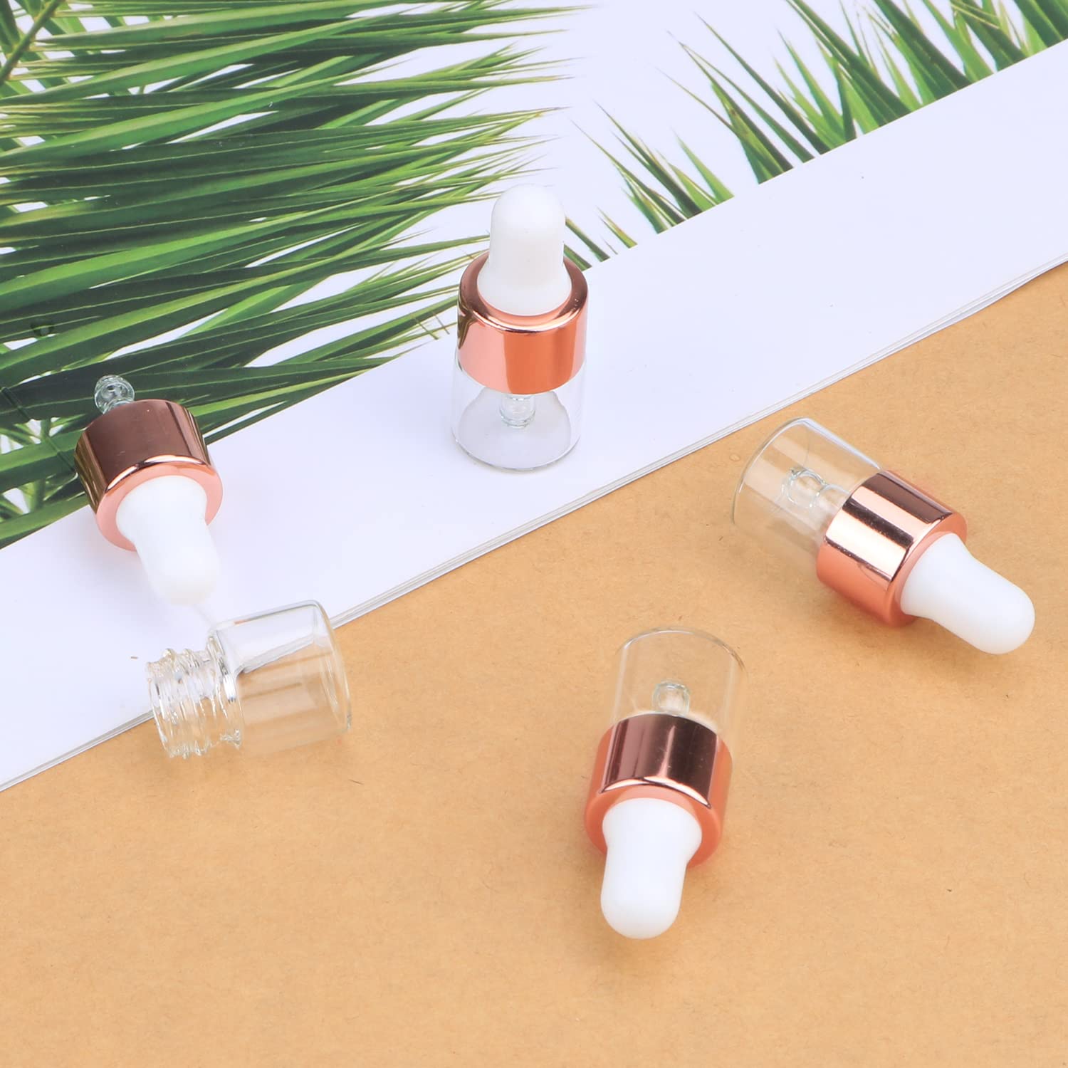 Clear Glass Dropper Bottles,50 Packs Essential Oils Bottles With Rose Gold Lids Perfume Sample Vials Travel DIY Cosmetic Liquid Containers 2 Pipettes Included (1ml(1/4 Dram))