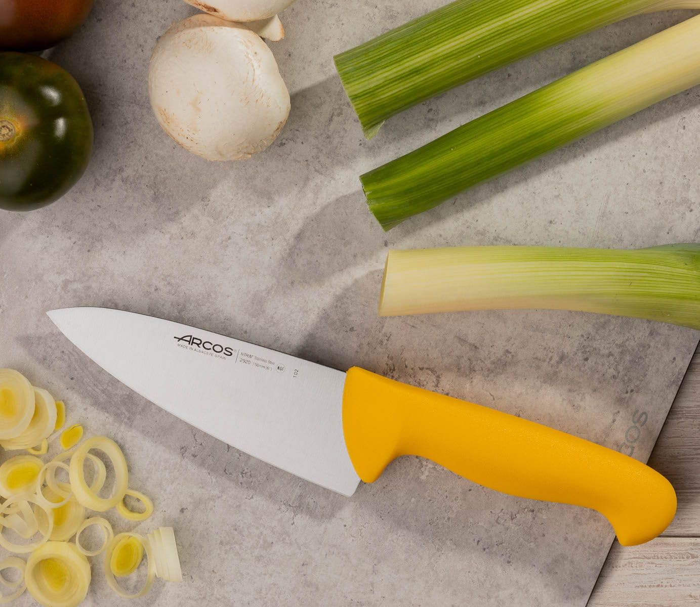 ARCOS Chef Knife 6 Inch Nitrum Stainless Steel and 150 mm blade. Professional Multipurpose Cooking Knife. Ergonomic Polypropylene Handle. Series 2900. Color Yellow