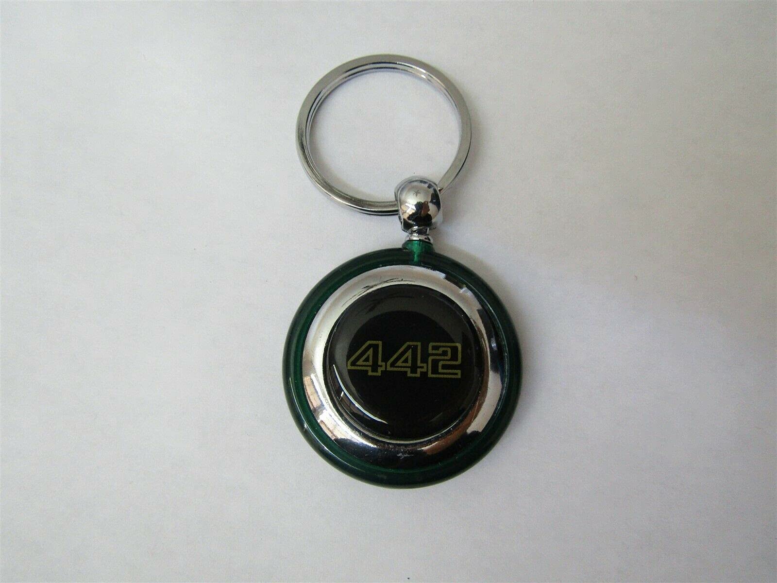 1970's 1986 1987 OLDS 442 4-4-2 GOLD/BLACK LOGO ROUND PLASTIC KEYCHAIN - GREEN