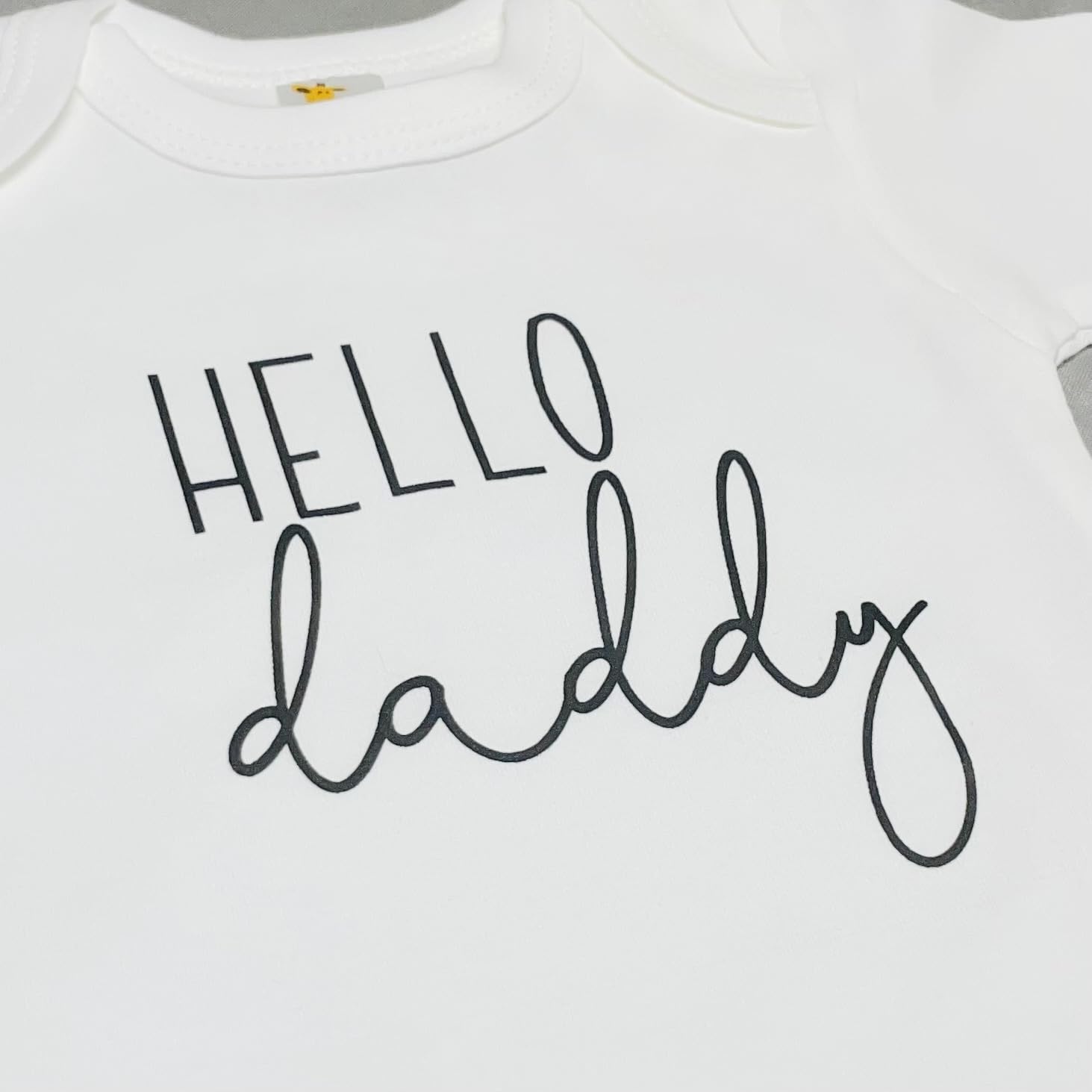 Bump and Beyond Designs Baby-Boys Hello Daddy Surprise Pregnancy Announcement Leotard to New Dad White, 0-3 Months