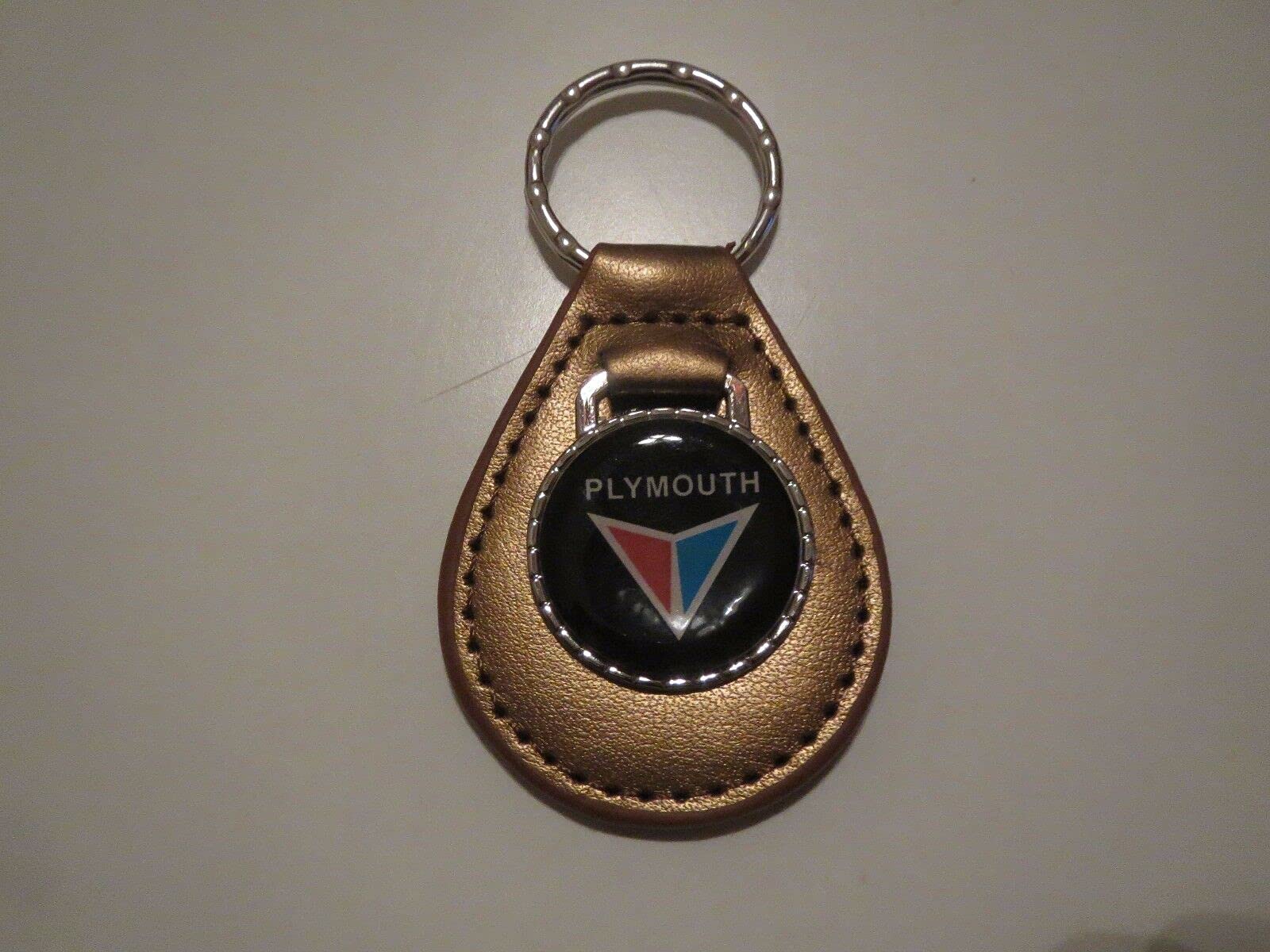 1960's BELVEDERE SAVOY PLAZA FURY VIP VALIANT BLUE & RED LOGO LEATHER KEYCHAIN - GOLD