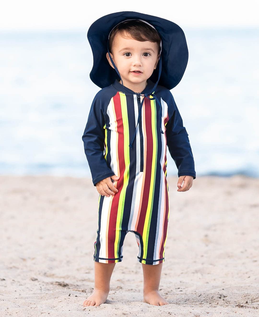 RUGGEDBUTTS Baby/Toddler Boy Swimsuit, One Piece Zipper Rash Guard Sunsuit with UPF 50+ Sun Protection - Sunset Stripe - 12-18m